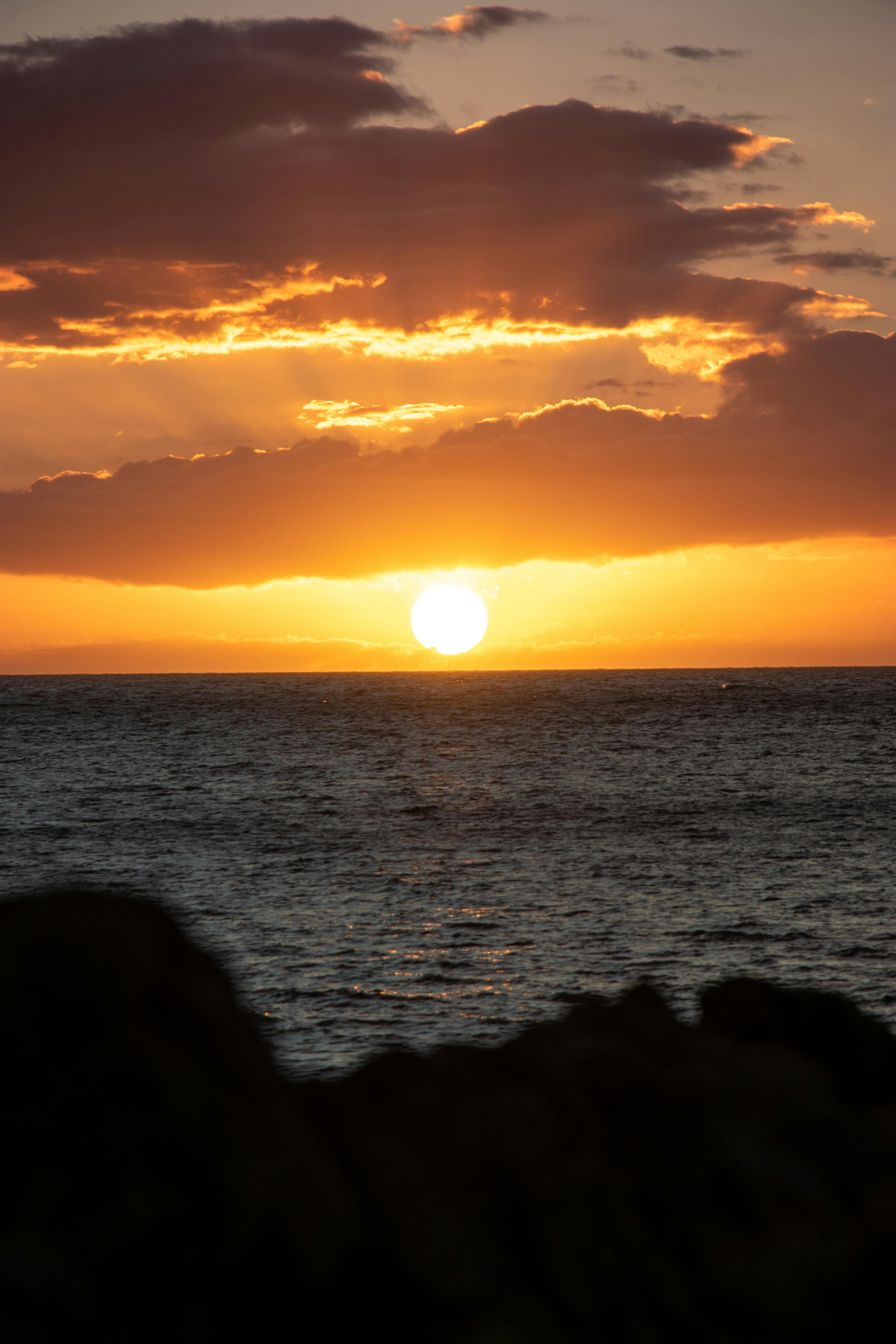 Clouds over Sea Shore at Sunset · Free Stock Photo