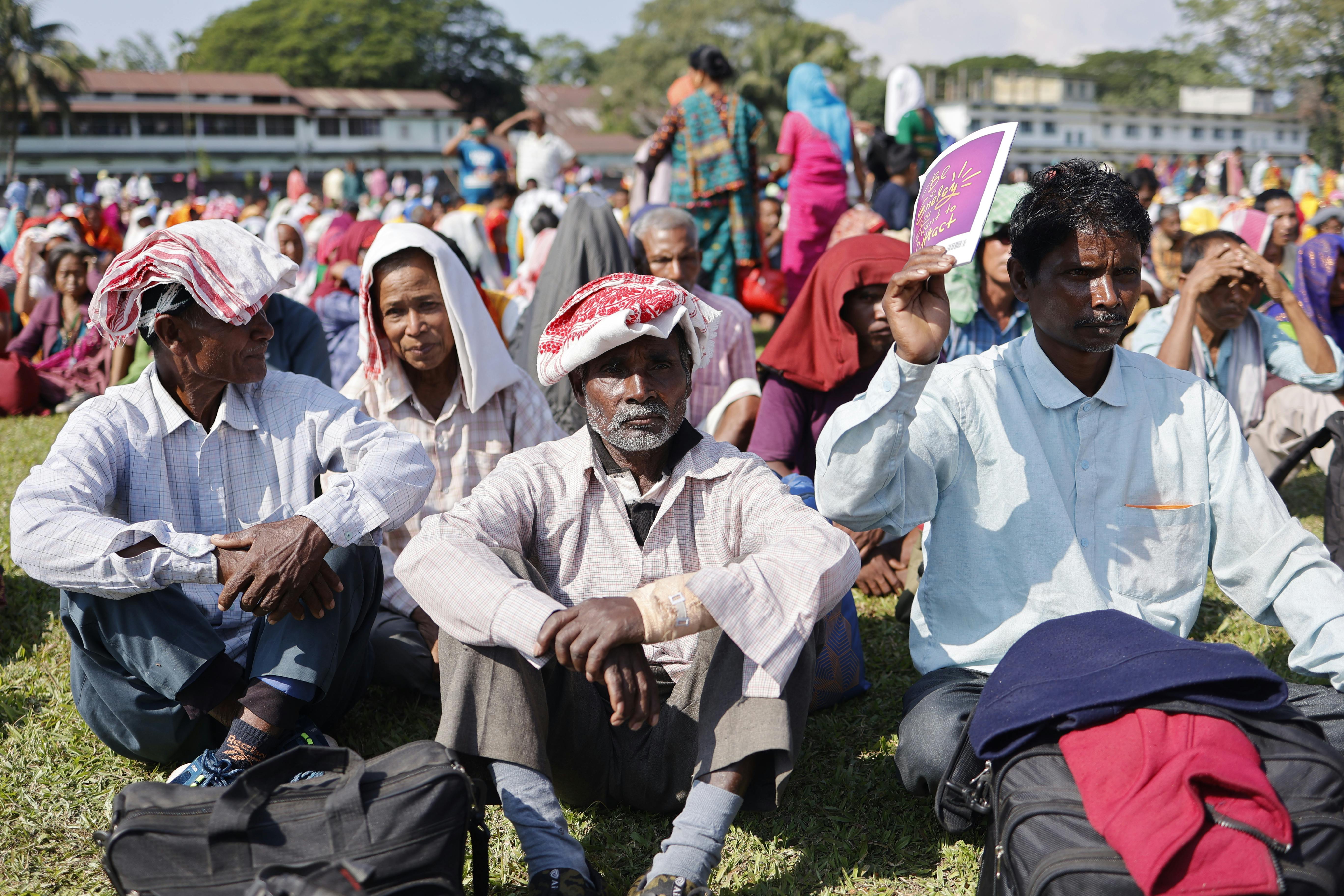 People Sitting Together on Grass · Free Stock Photo