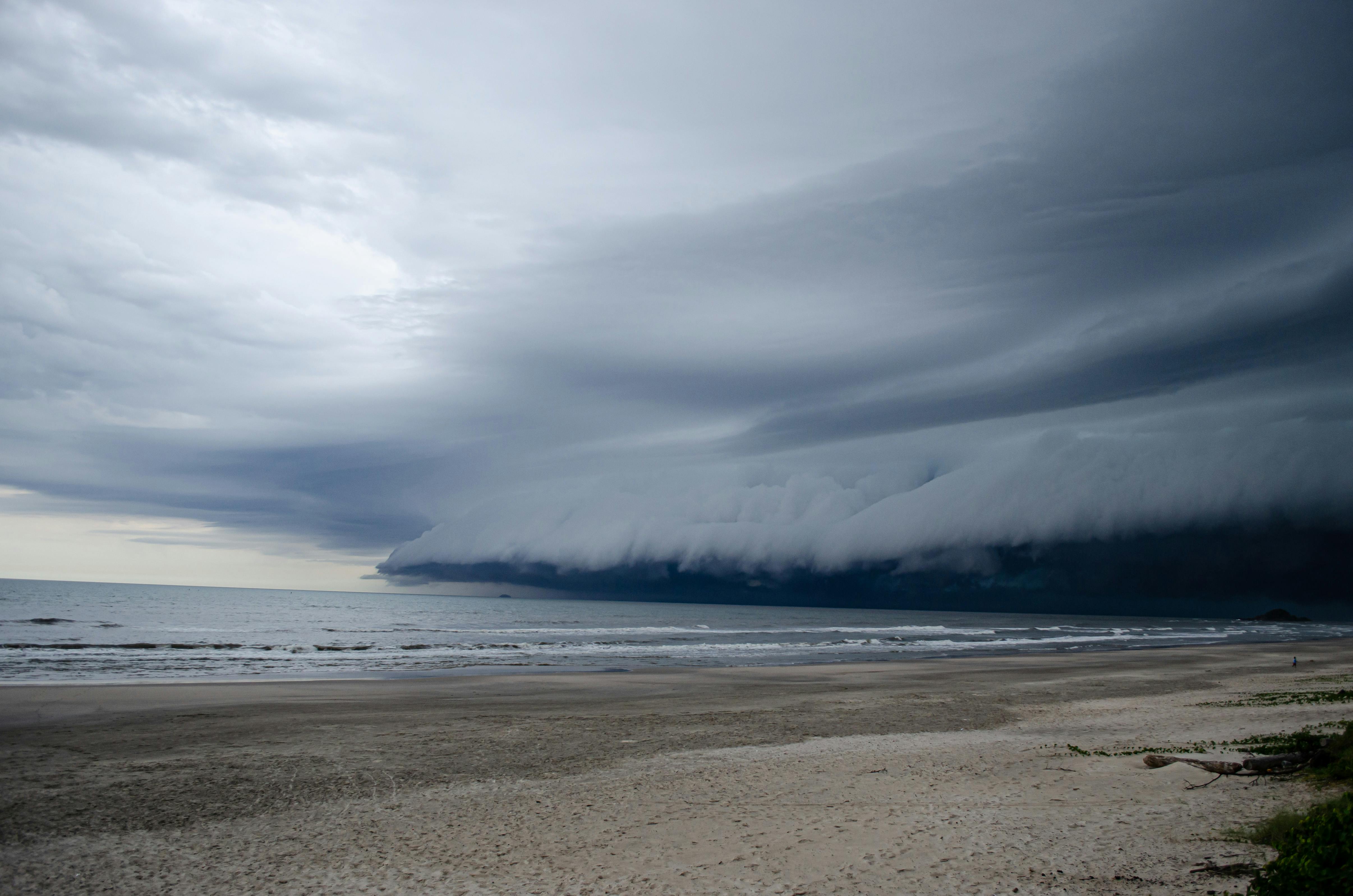 Storm Cloud over the Sea and Beach · Free Stock Photo