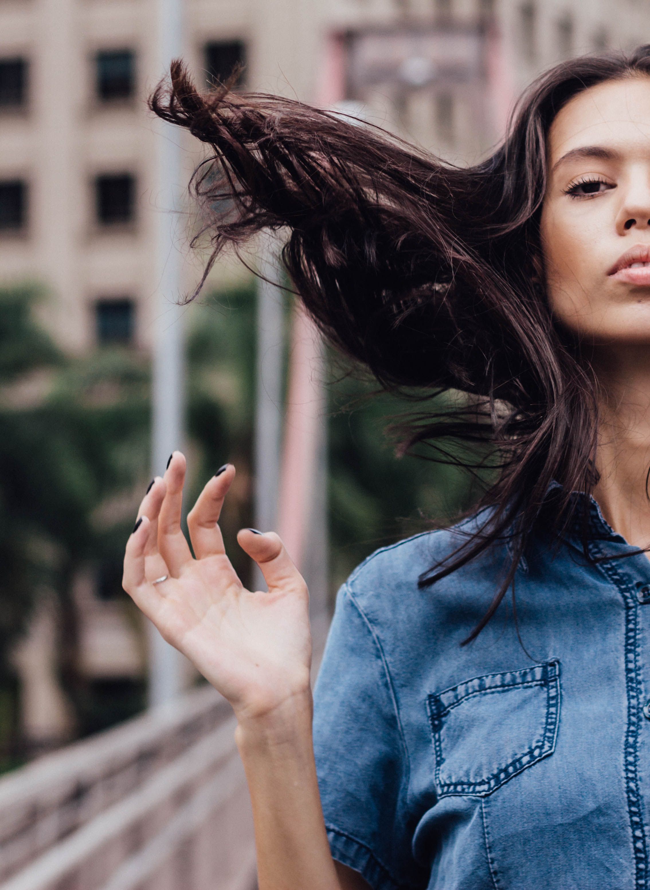 A Woman Doing a Hair Flip · Free Stock Photo