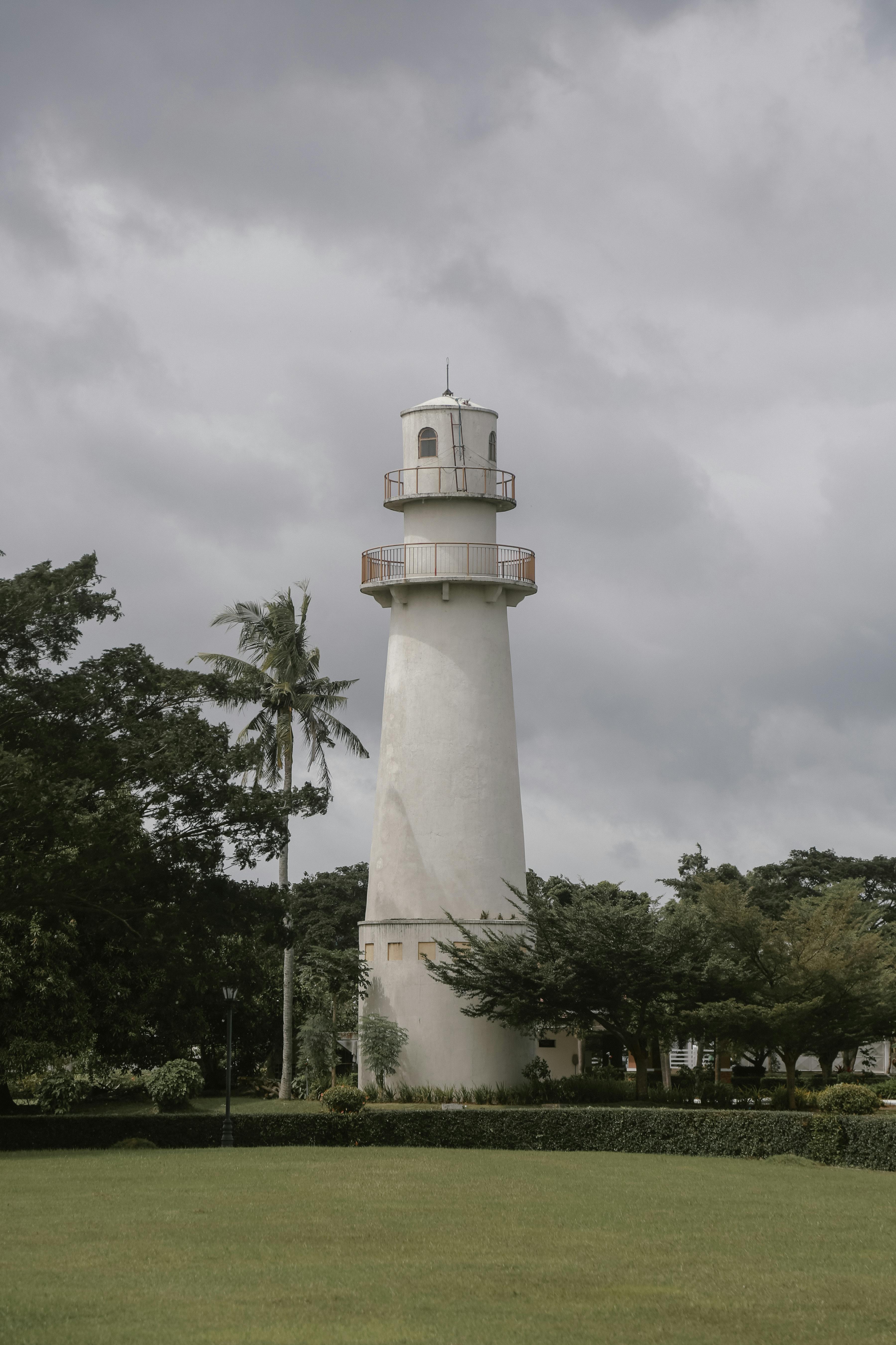 White Lighthouse and a Park · Free Stock Photo