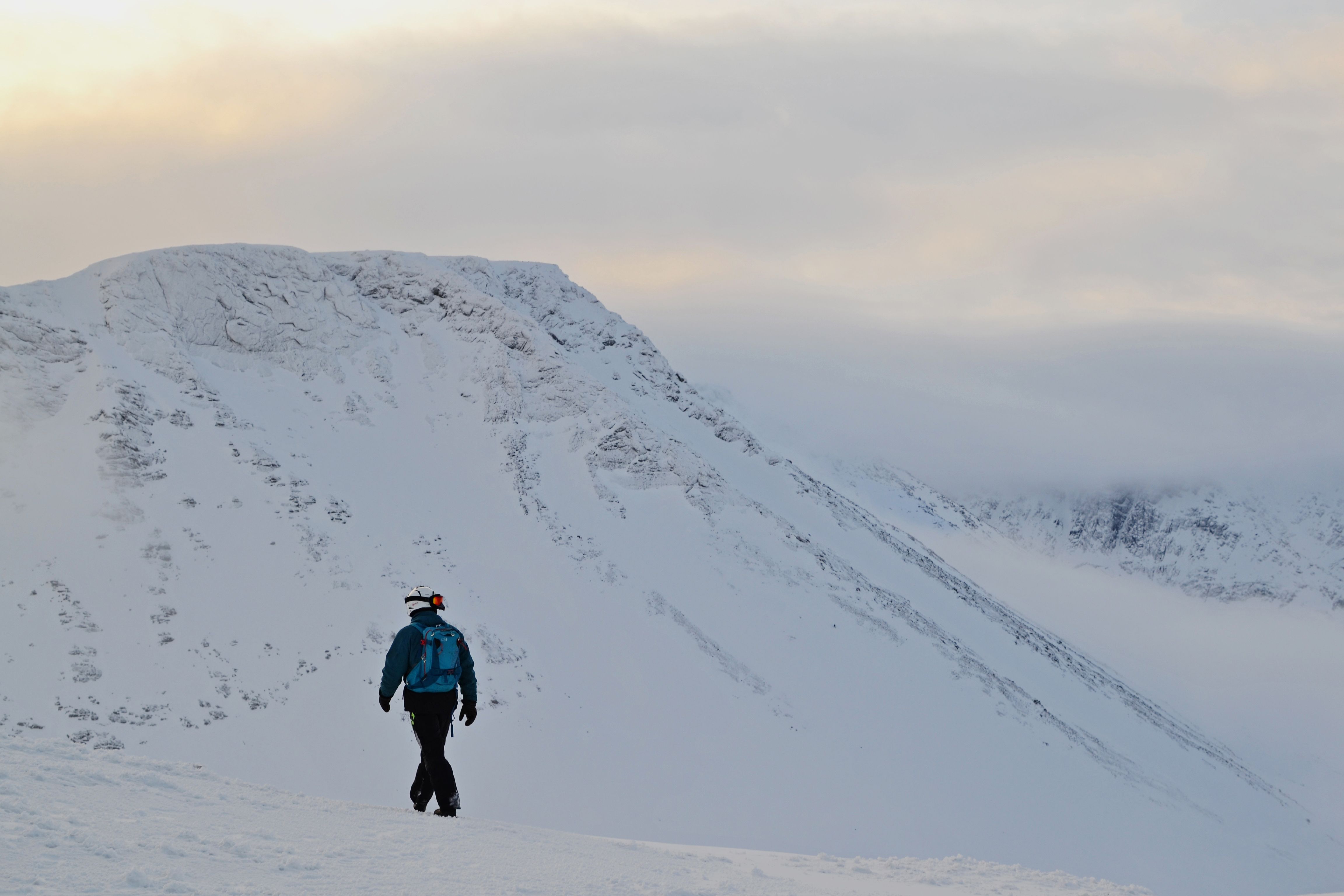 Backpacker High in Mountains · Free Stock Photo