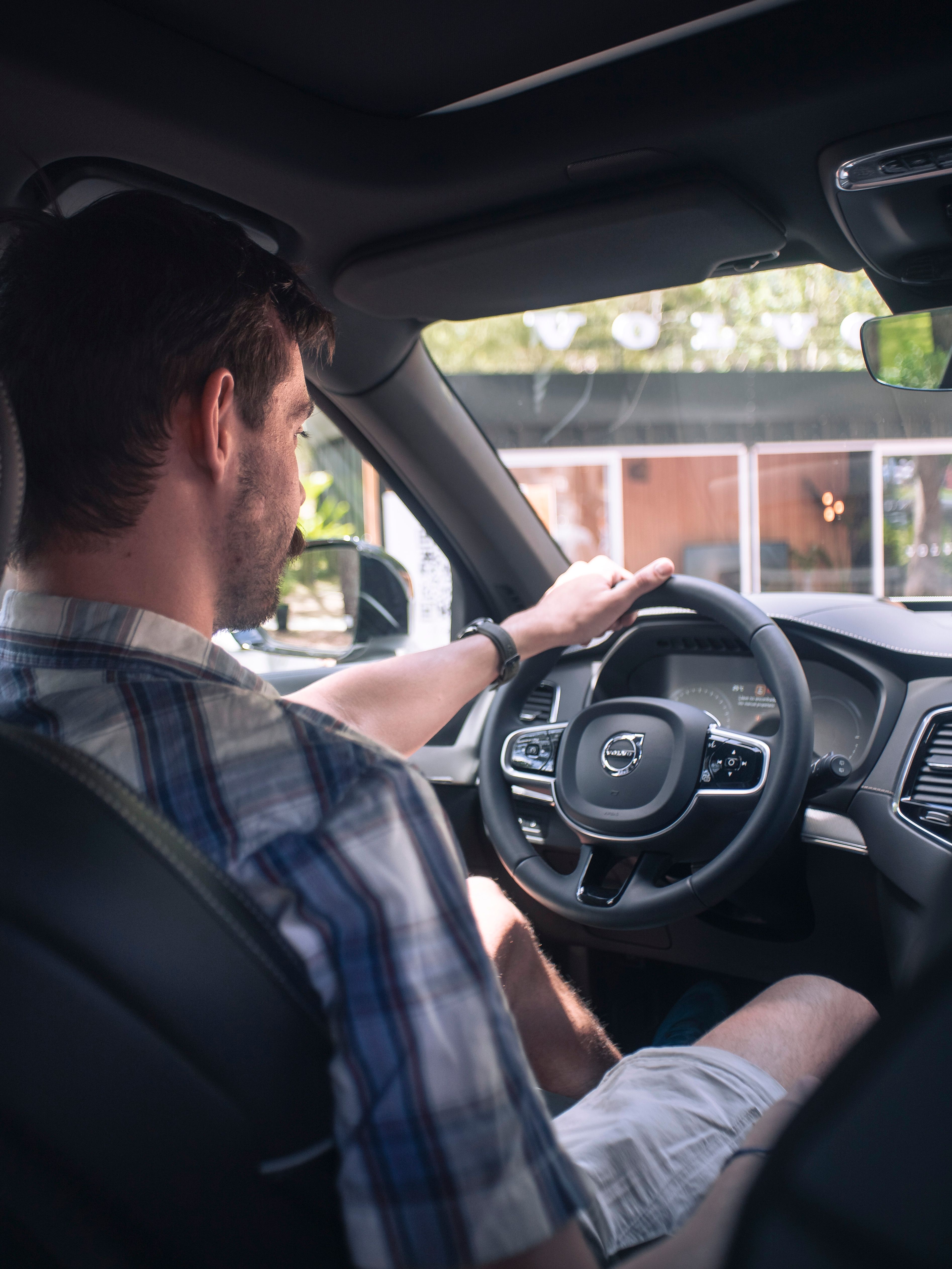 Man Holding Steering Wheel · Free Stock Photo