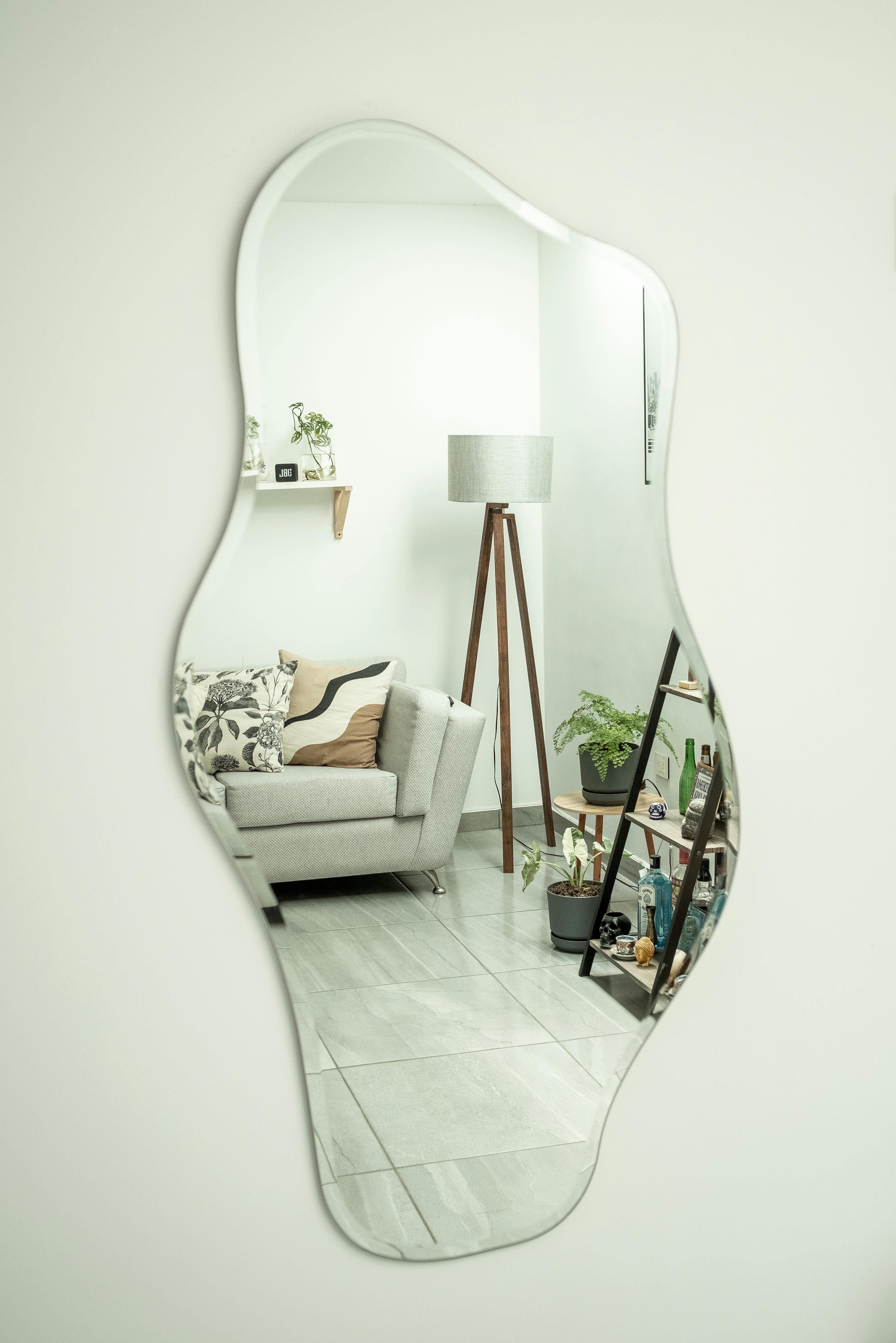 Interior Design Reflection in Mirror Hanging on Wall · Free Stock Photo