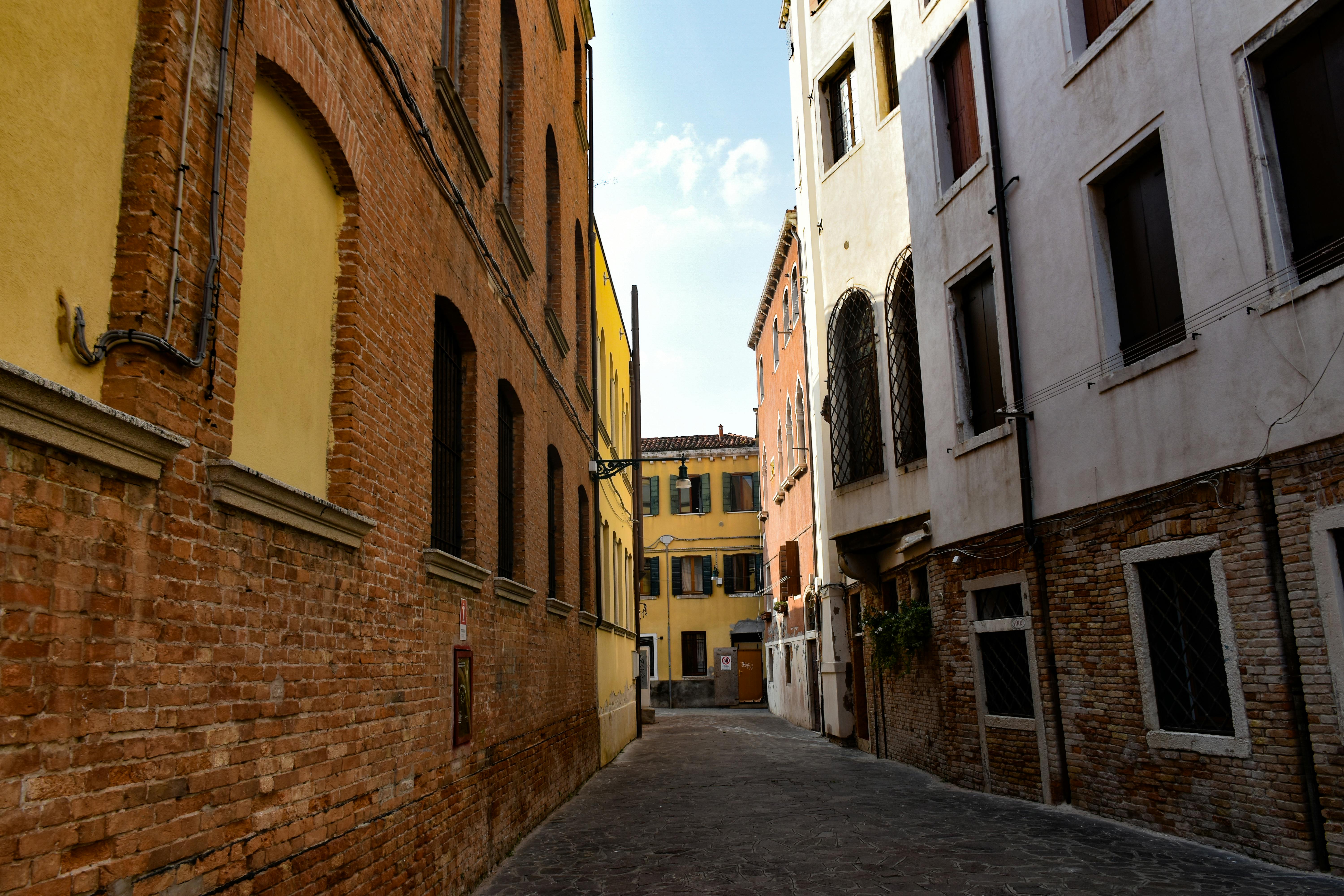 Traditional Townhouses and a a Paved Street in an Italian City · Free ...
