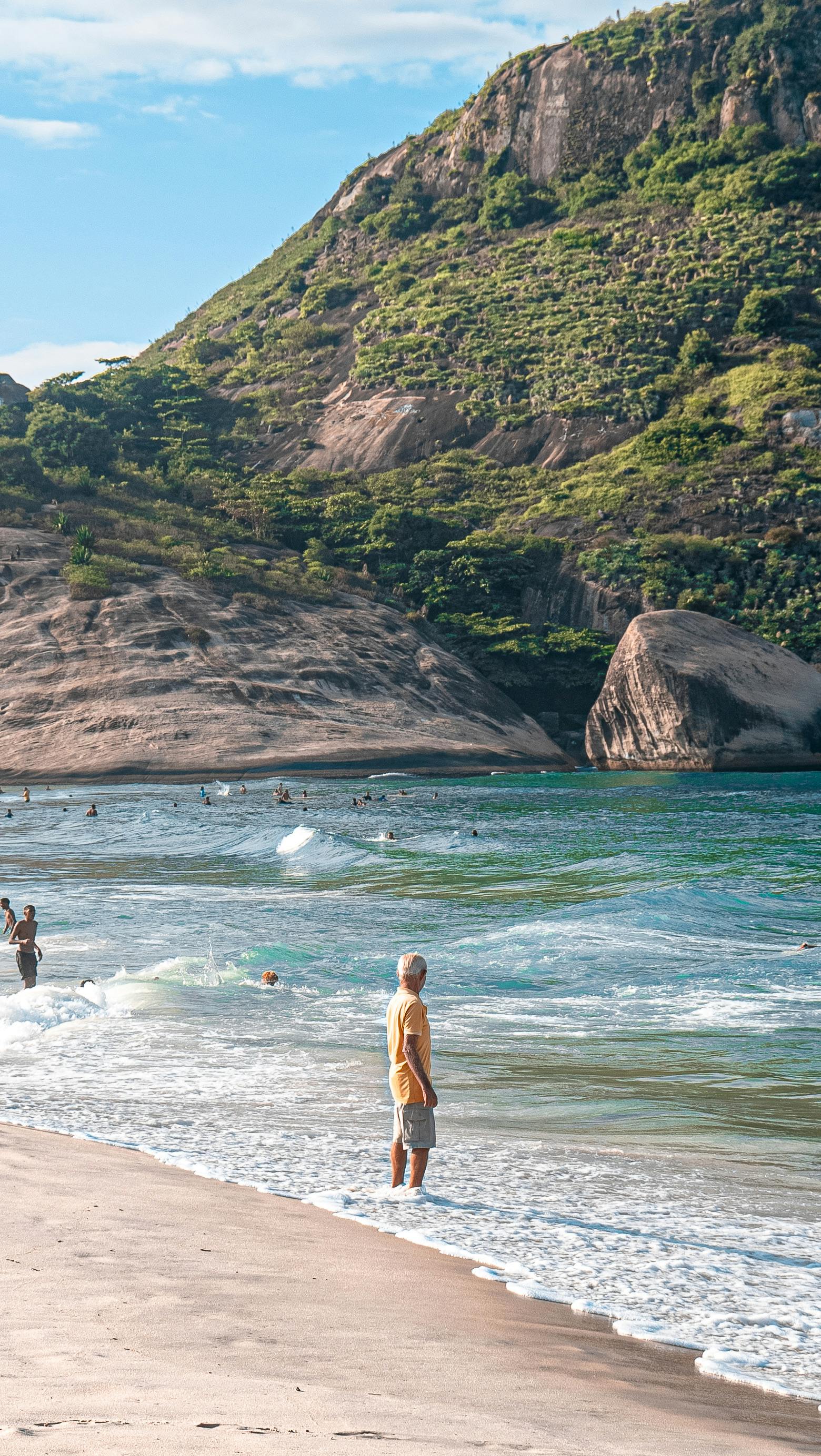 Elderly Man Wading in the Sea · Free Stock Photo