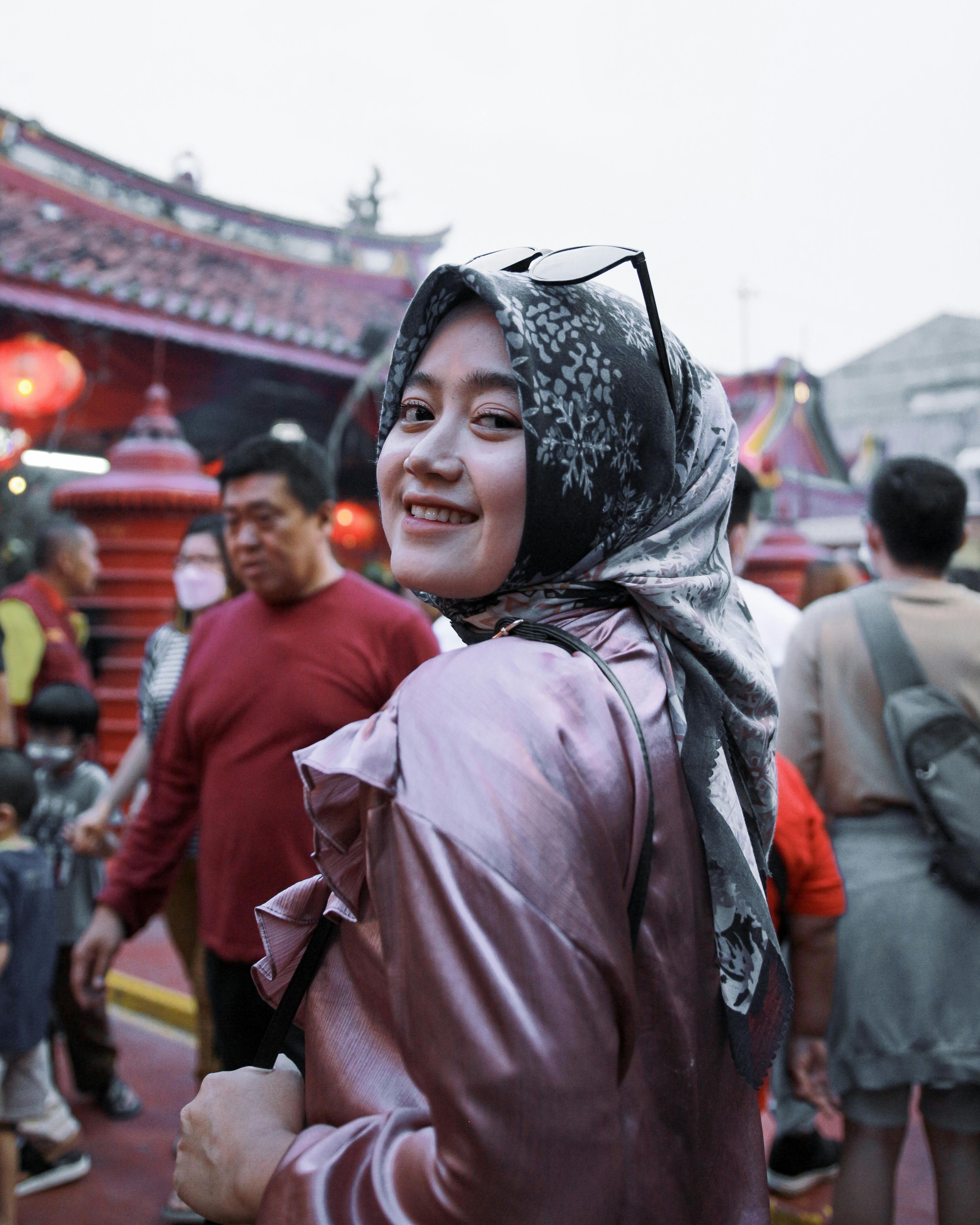 Smiling Woman in Hijab among People · Free Stock Photo