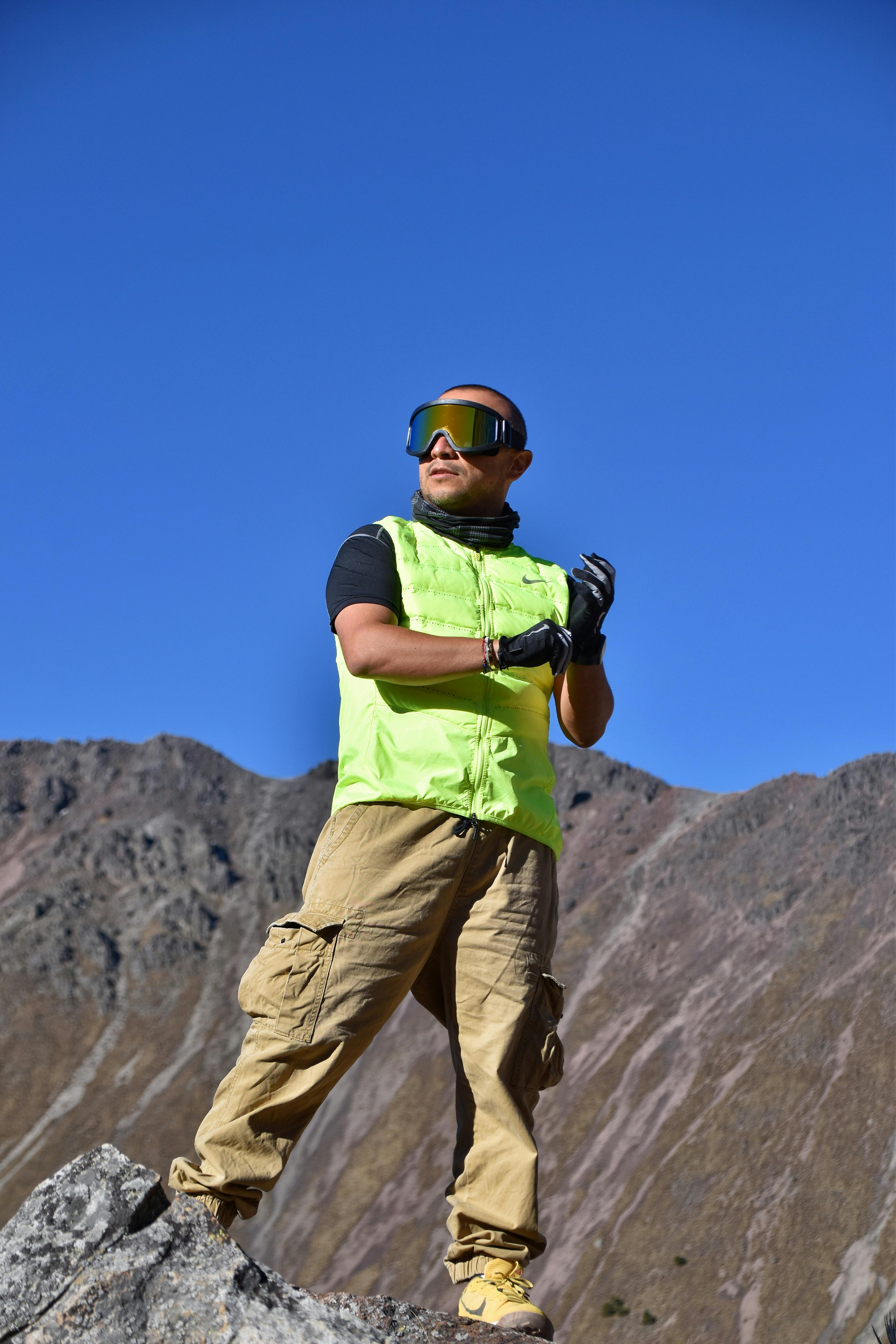 Man Standing on Mountain · Free Stock Photo