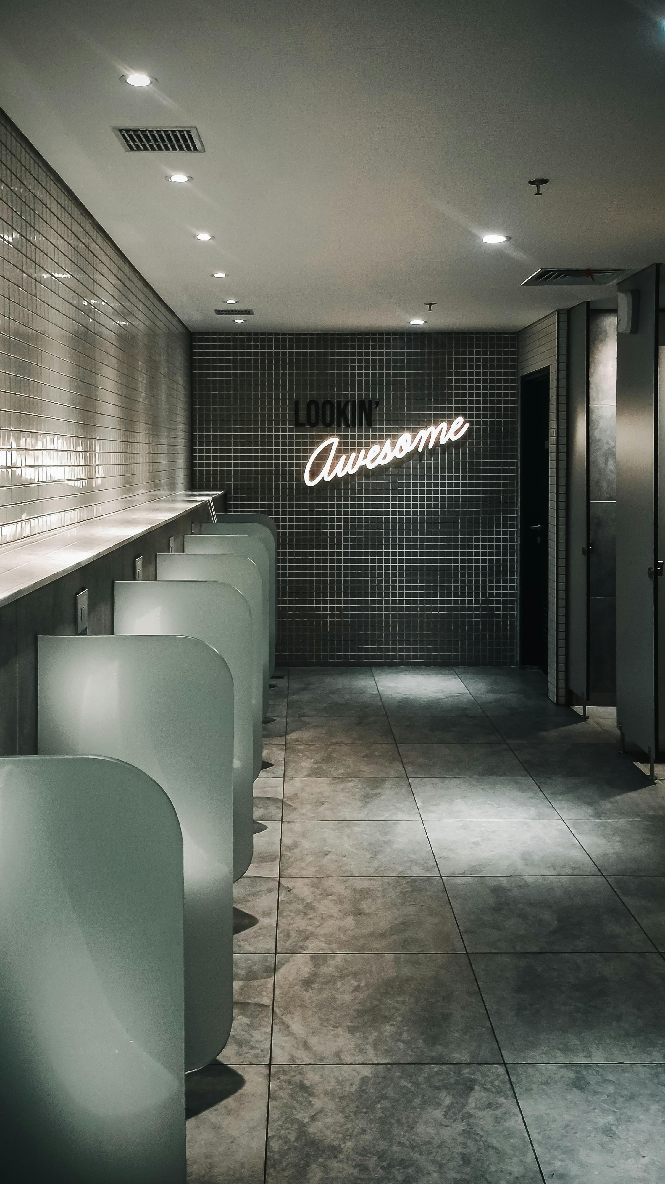 Photograph of a Restroom with Urinals · Free Stock Photo