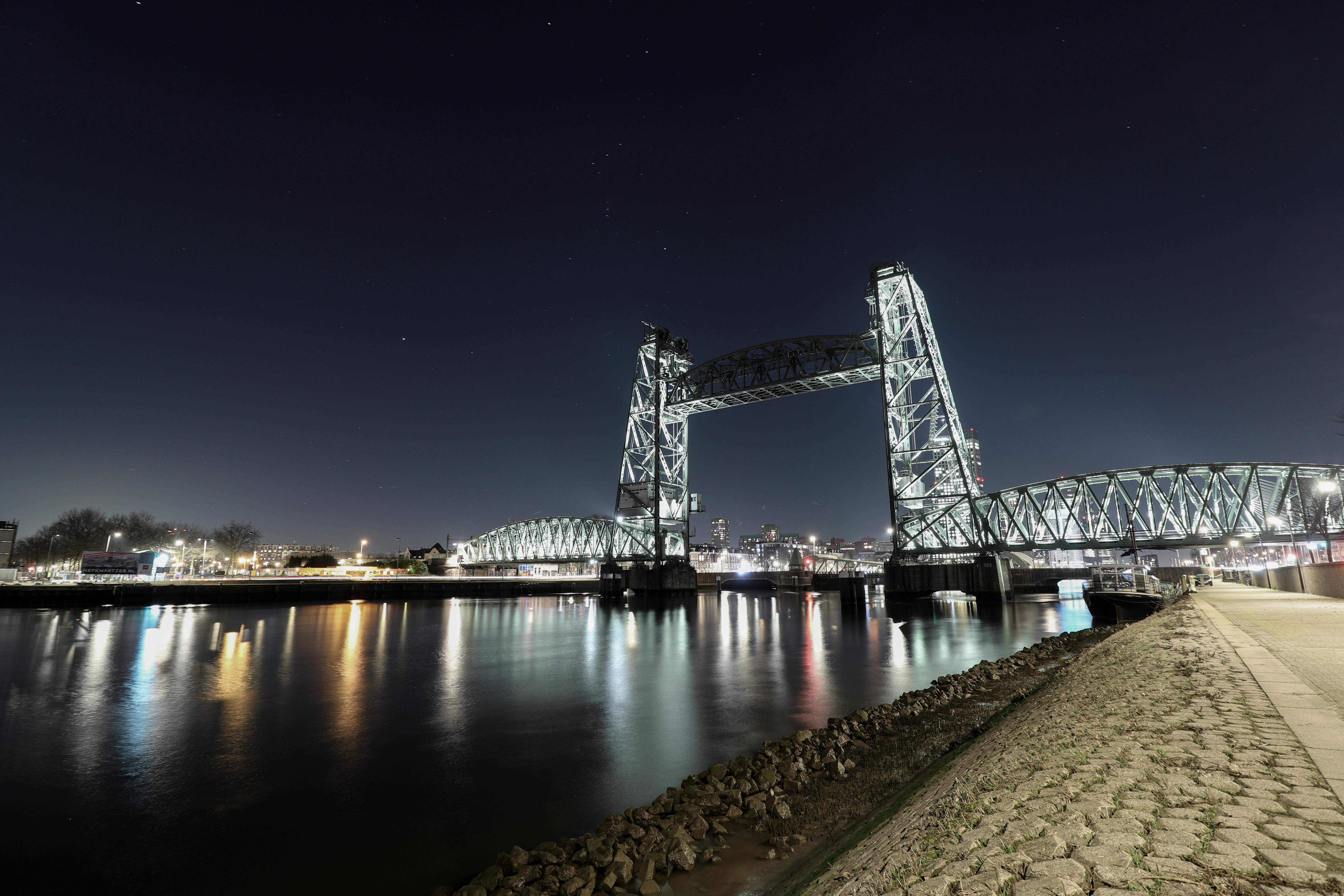 Illuminated Suspension Bridge Against Sky at Night · Free Stock Photo