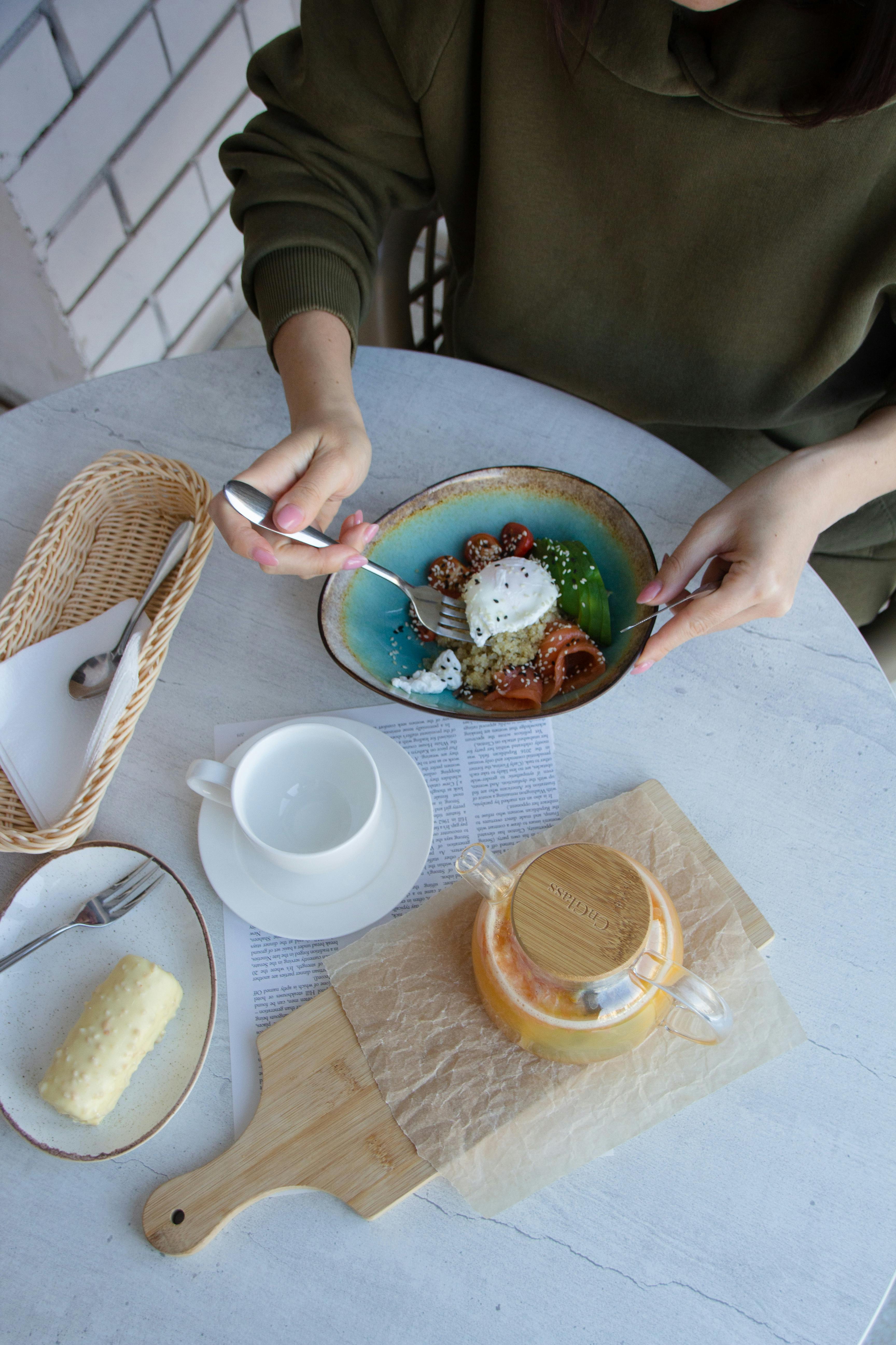 Woman Hands over Table with Breakfast · Free Stock Photo