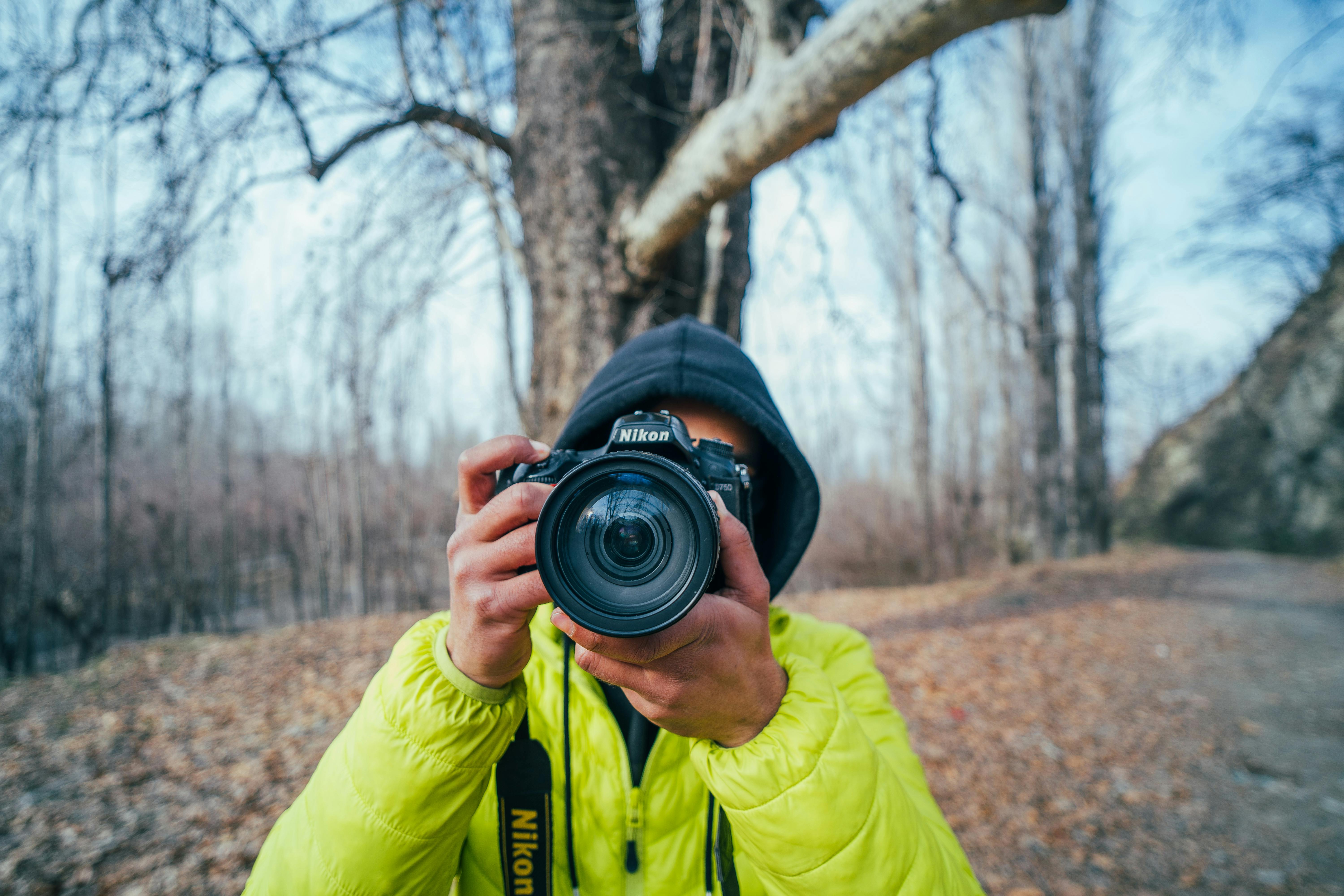 Person Holding Camera · Free Stock Photo