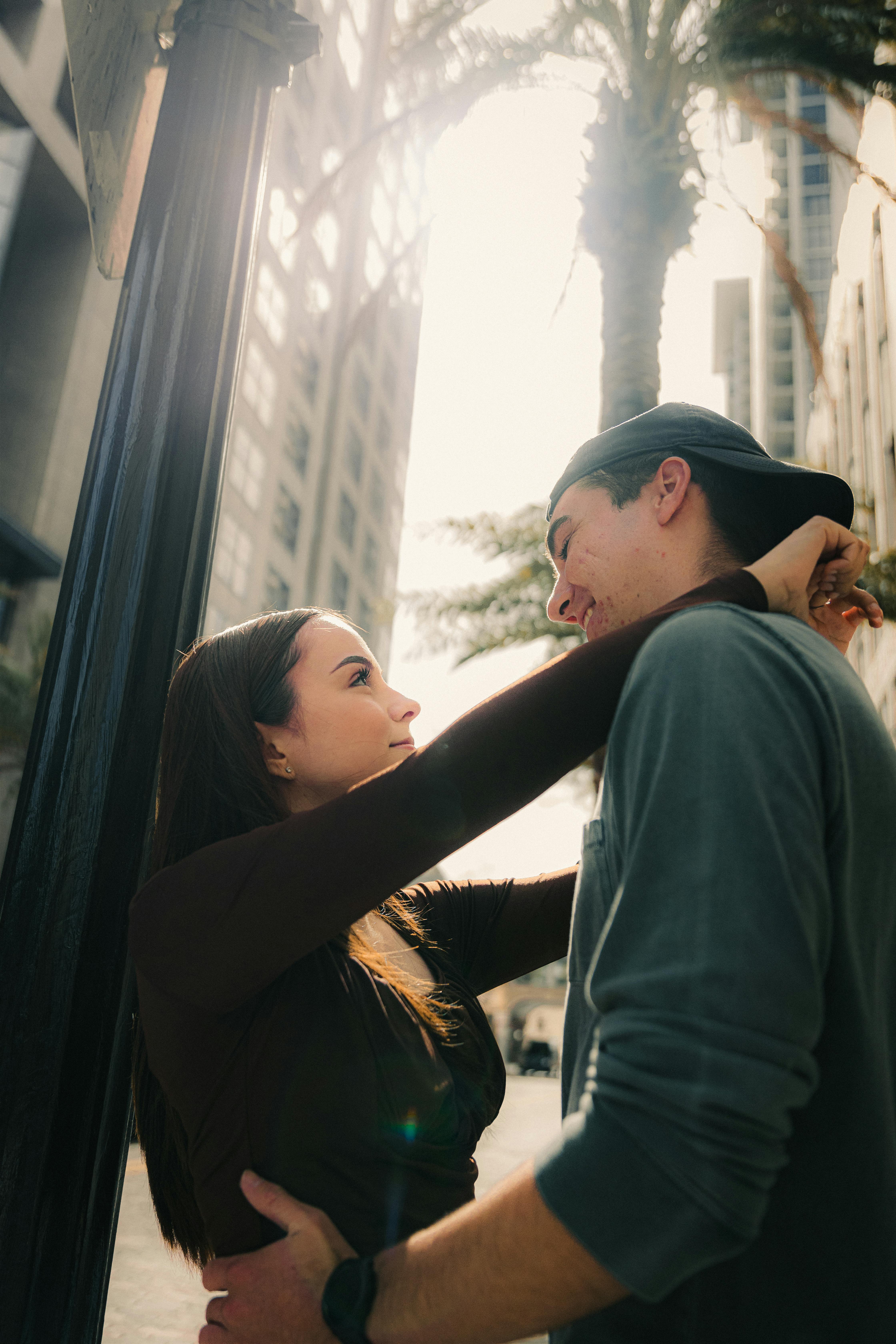 Sunlight over Hugging Couple · Free Stock Photo