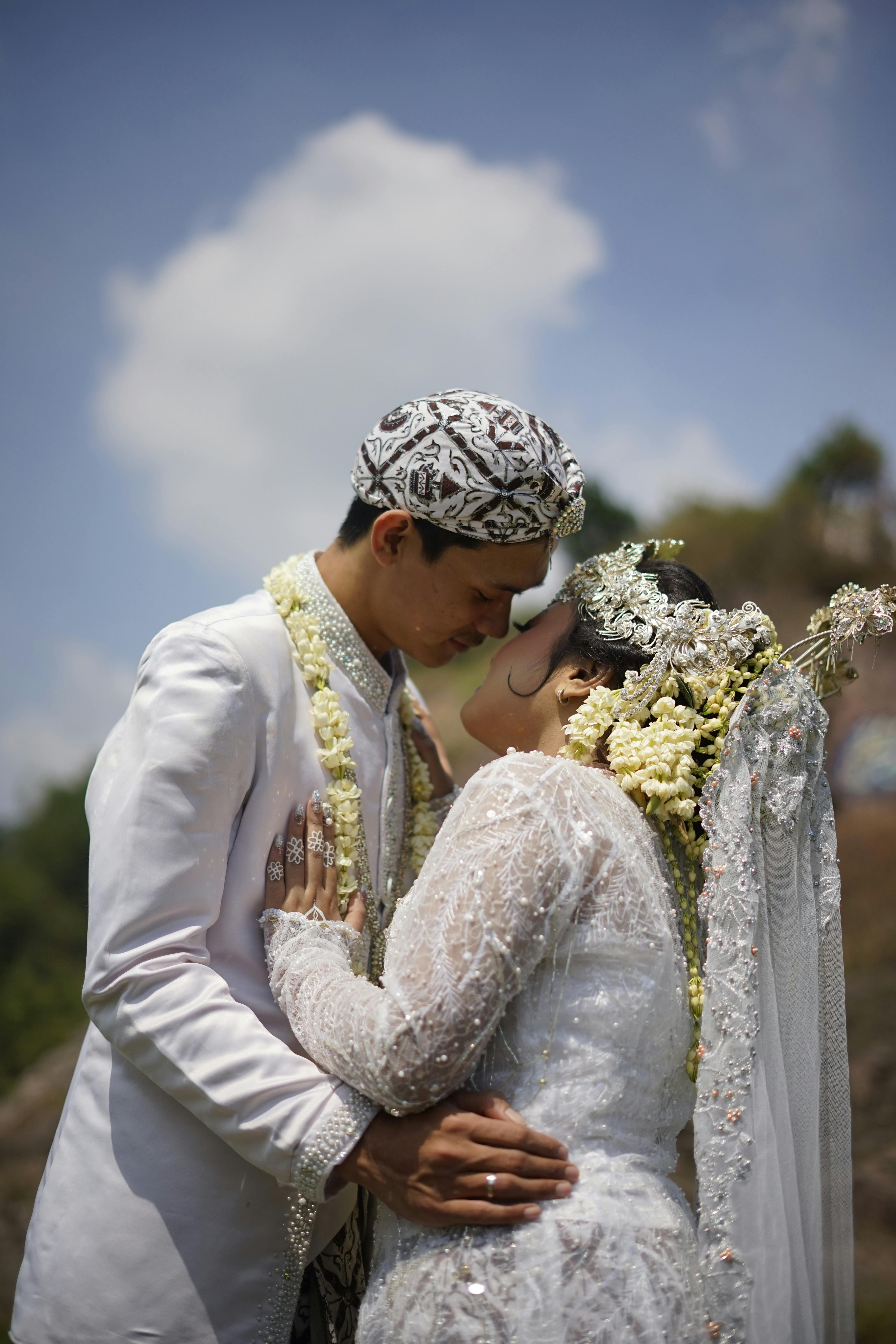 Muslim Bride and Groom Standing Close Together and Smiling · Free Stock ...