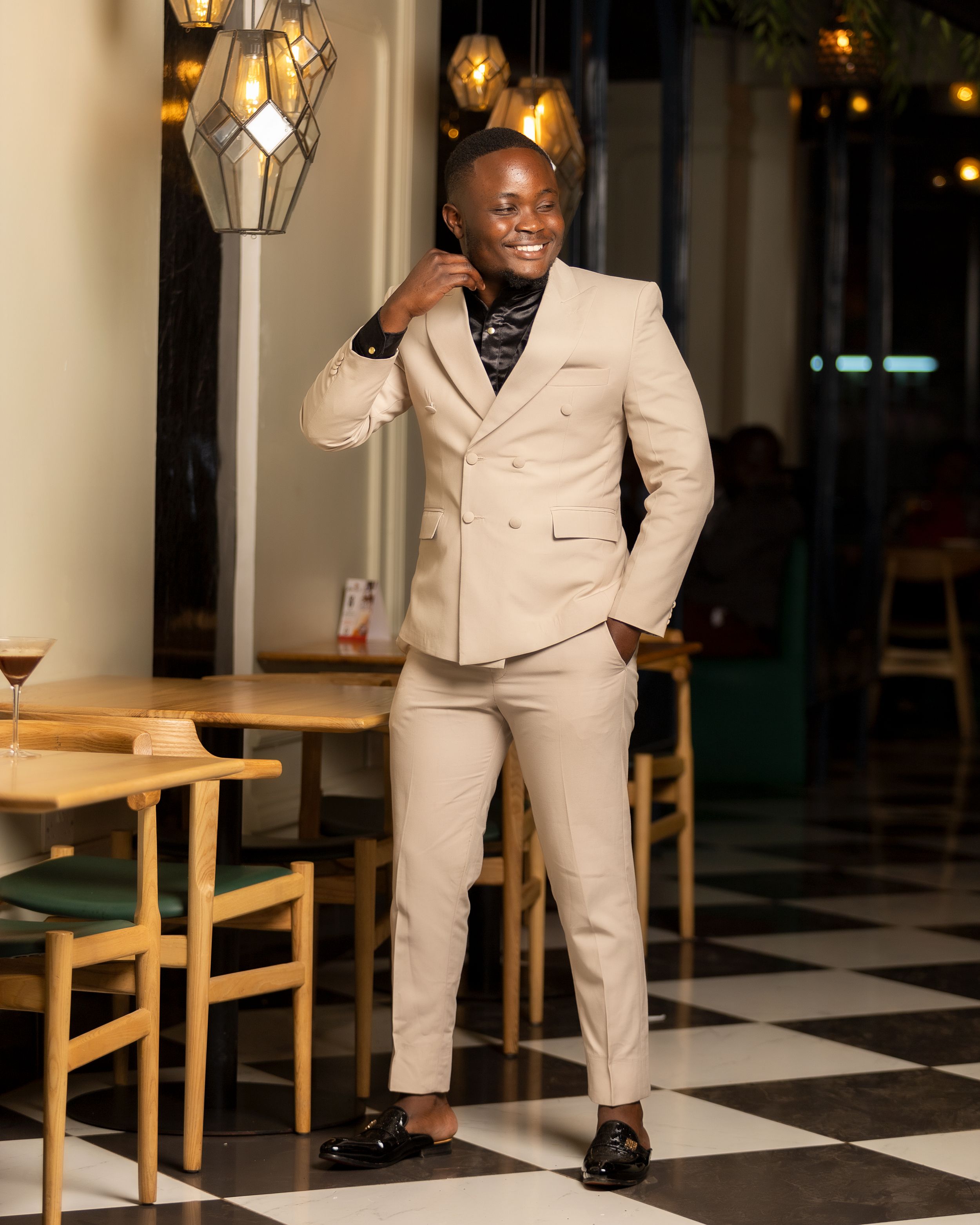 A Man in Beige Suit Smiling and Posing · Free Stock Photo