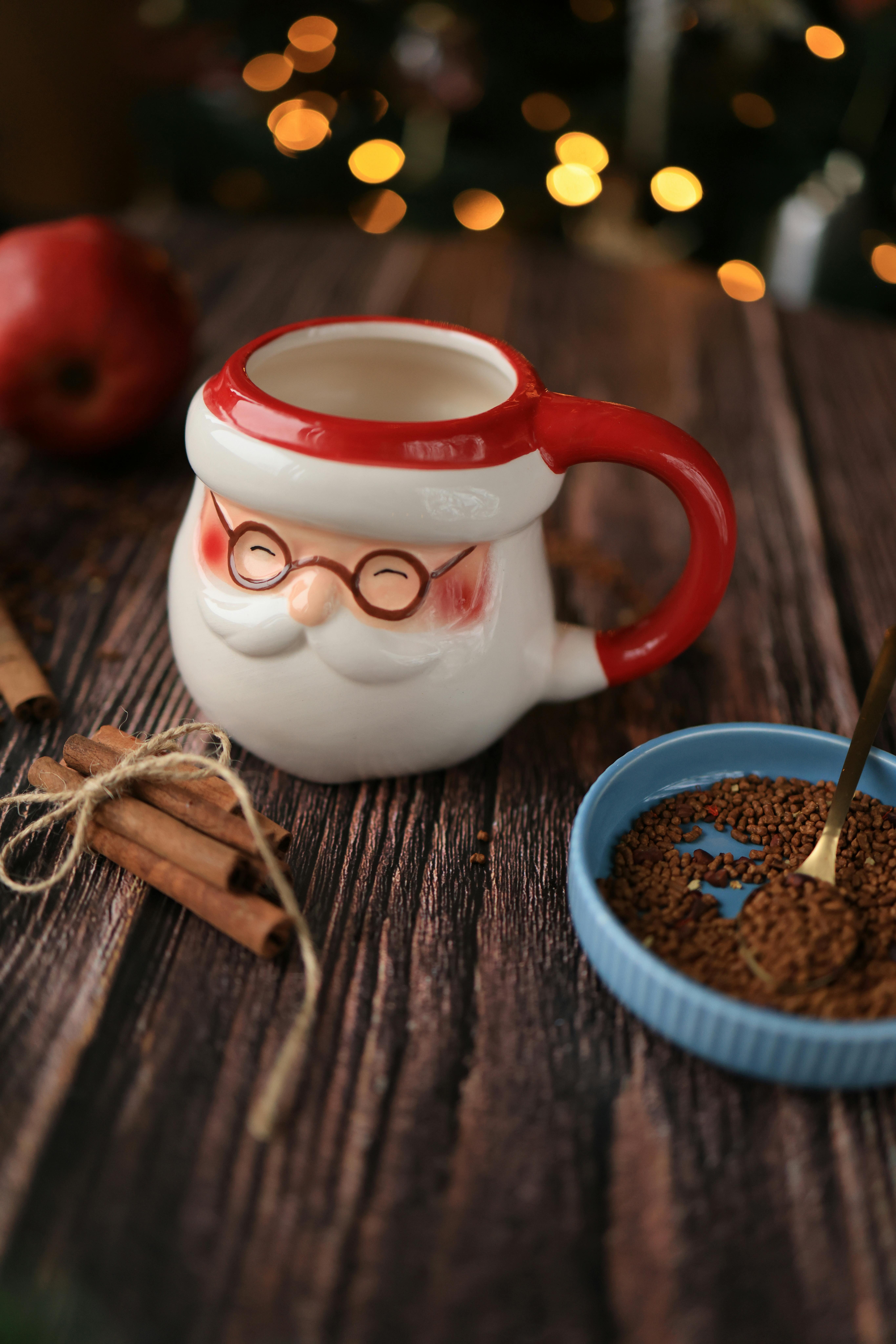 Santa Claus Cup and Cinnamon Bundle · Free Stock Photo