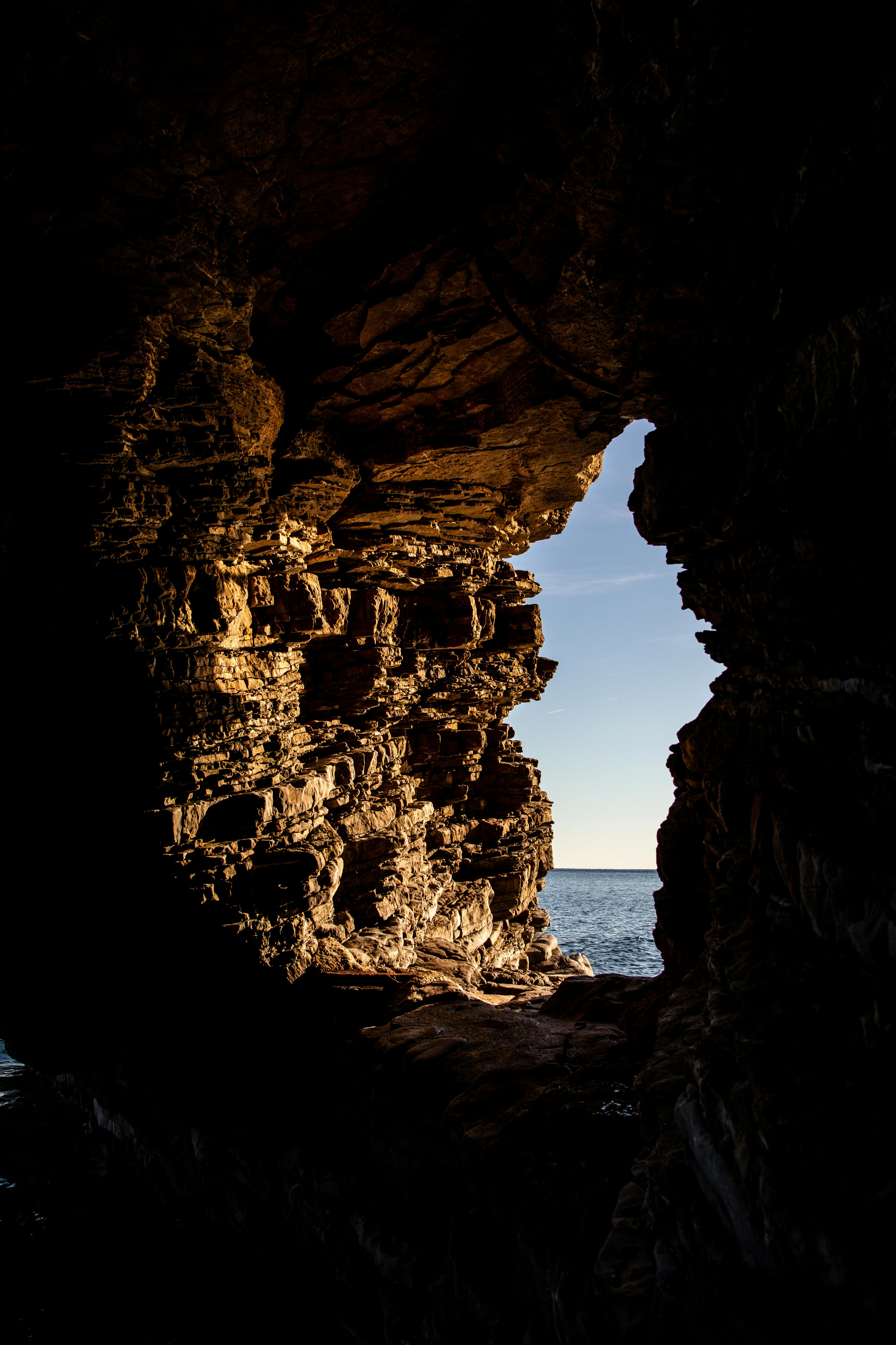A hole in the rock on the shore of the Adriatic Sea · Free Stock Photo