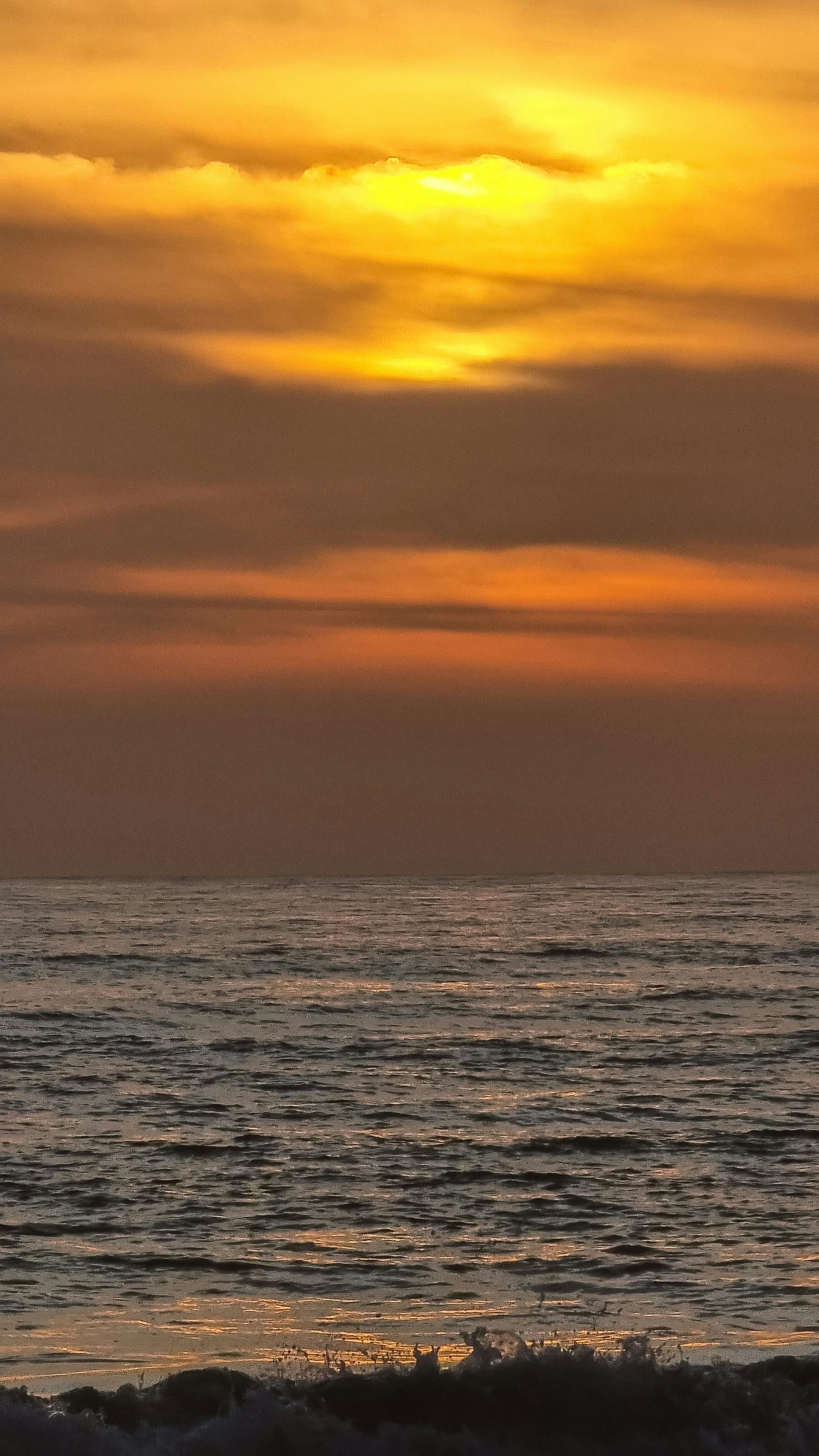 Yellow Sky over Sea Shore · Free Stock Photo