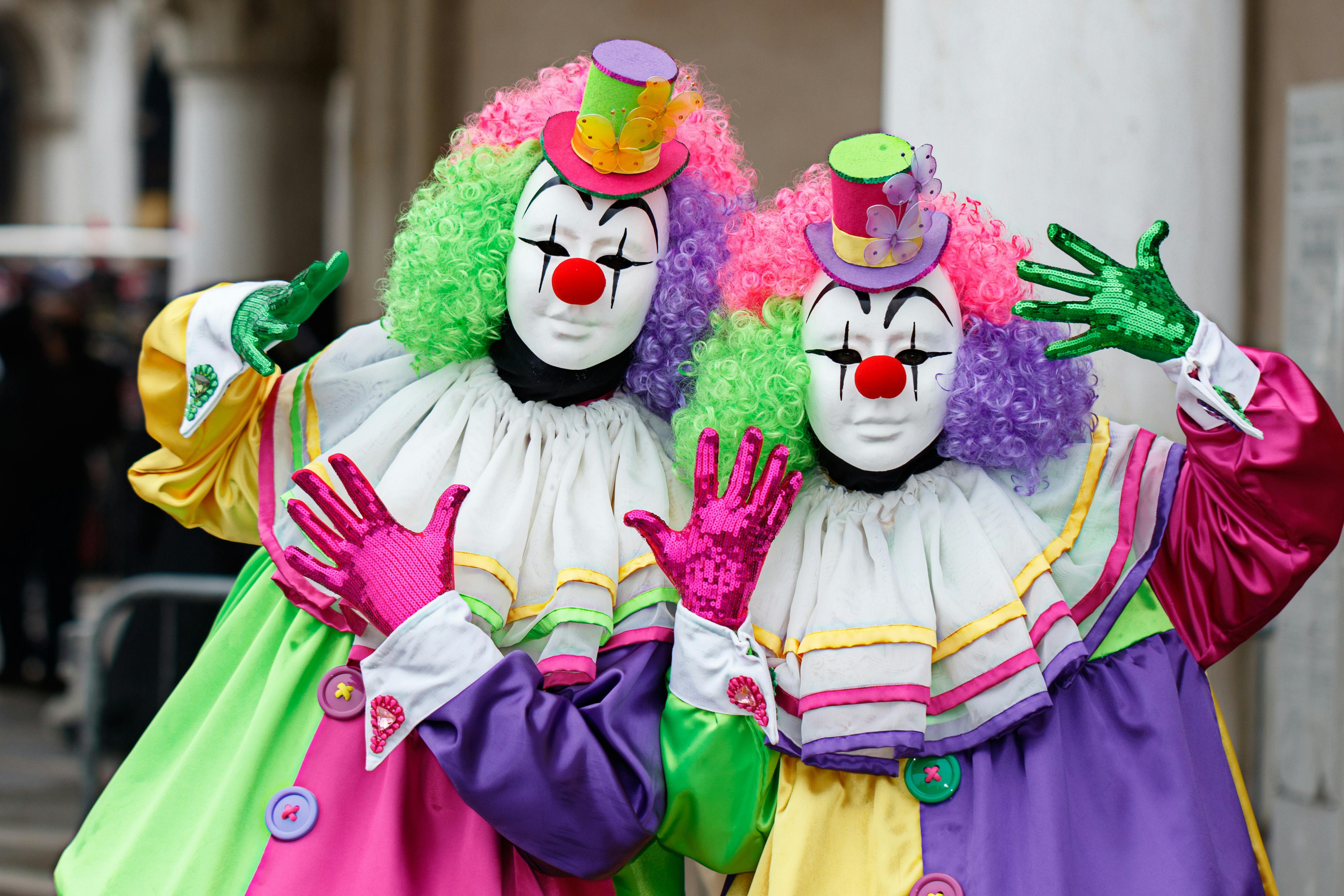 People Posing in Clowns Costumes · Free Stock Photo