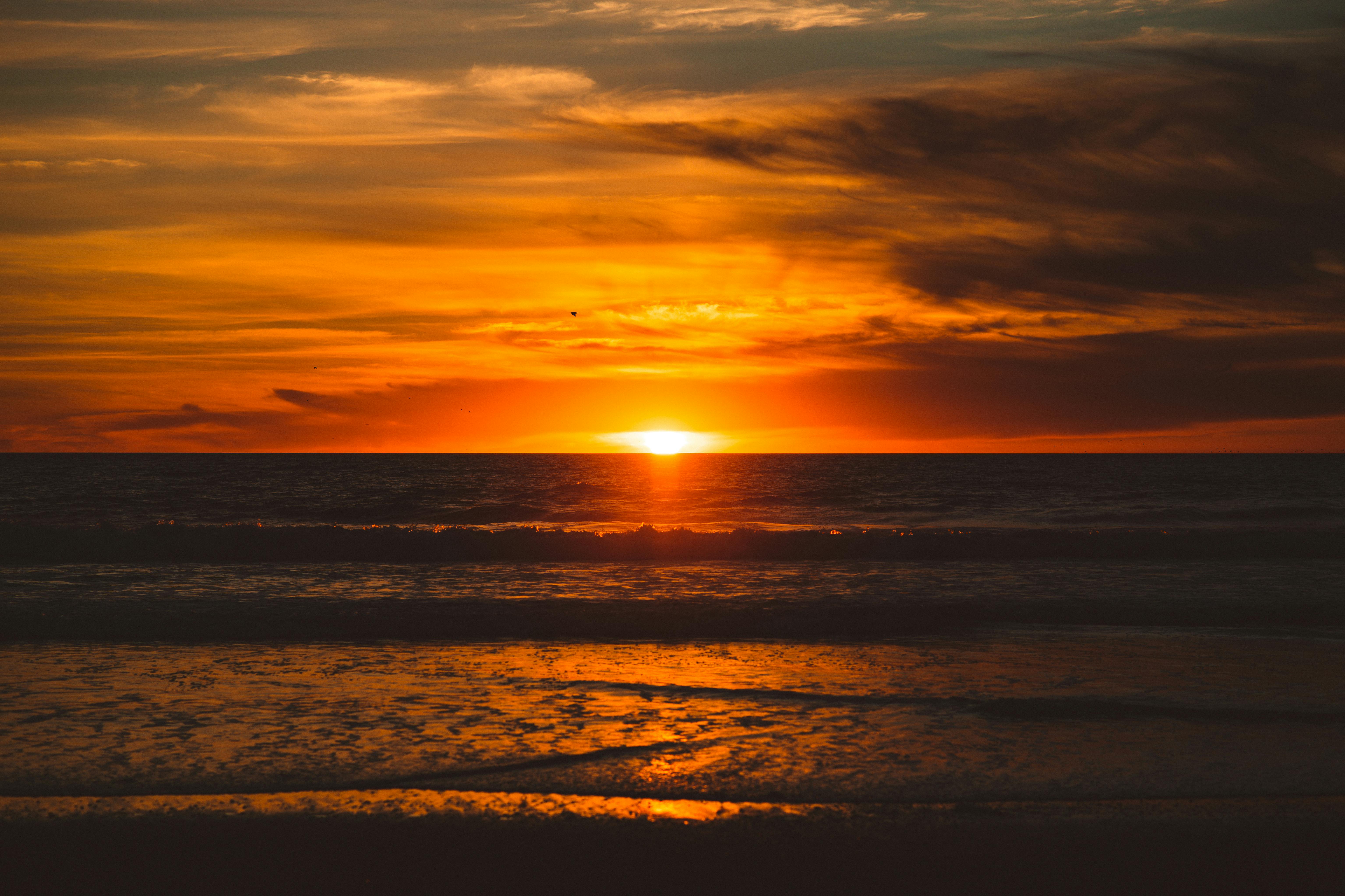 Blurred Photo of the Sea at Sunset · Free Stock Photo
