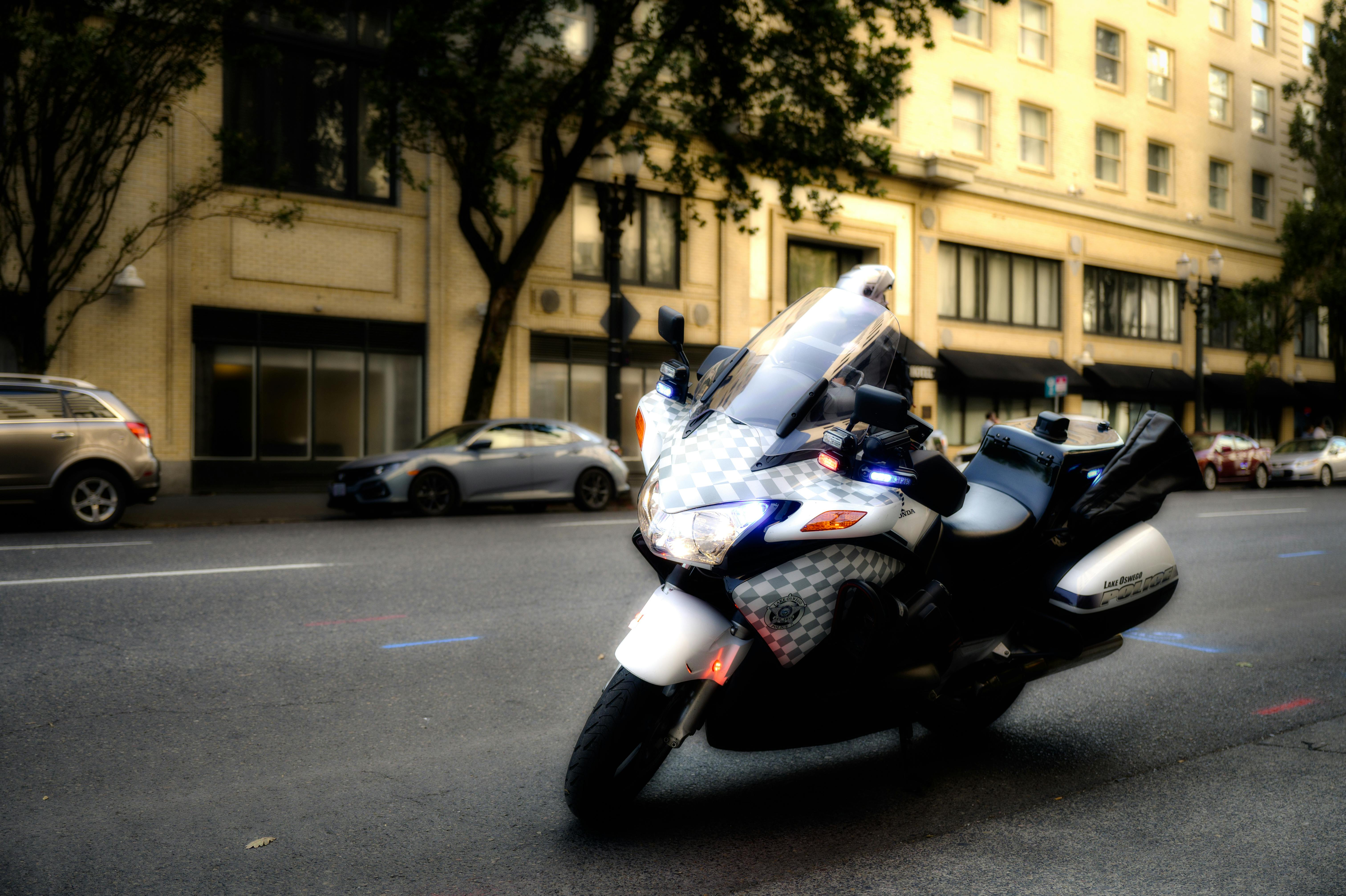 Police Motorcycle in Middle of Road · Free Stock Photo