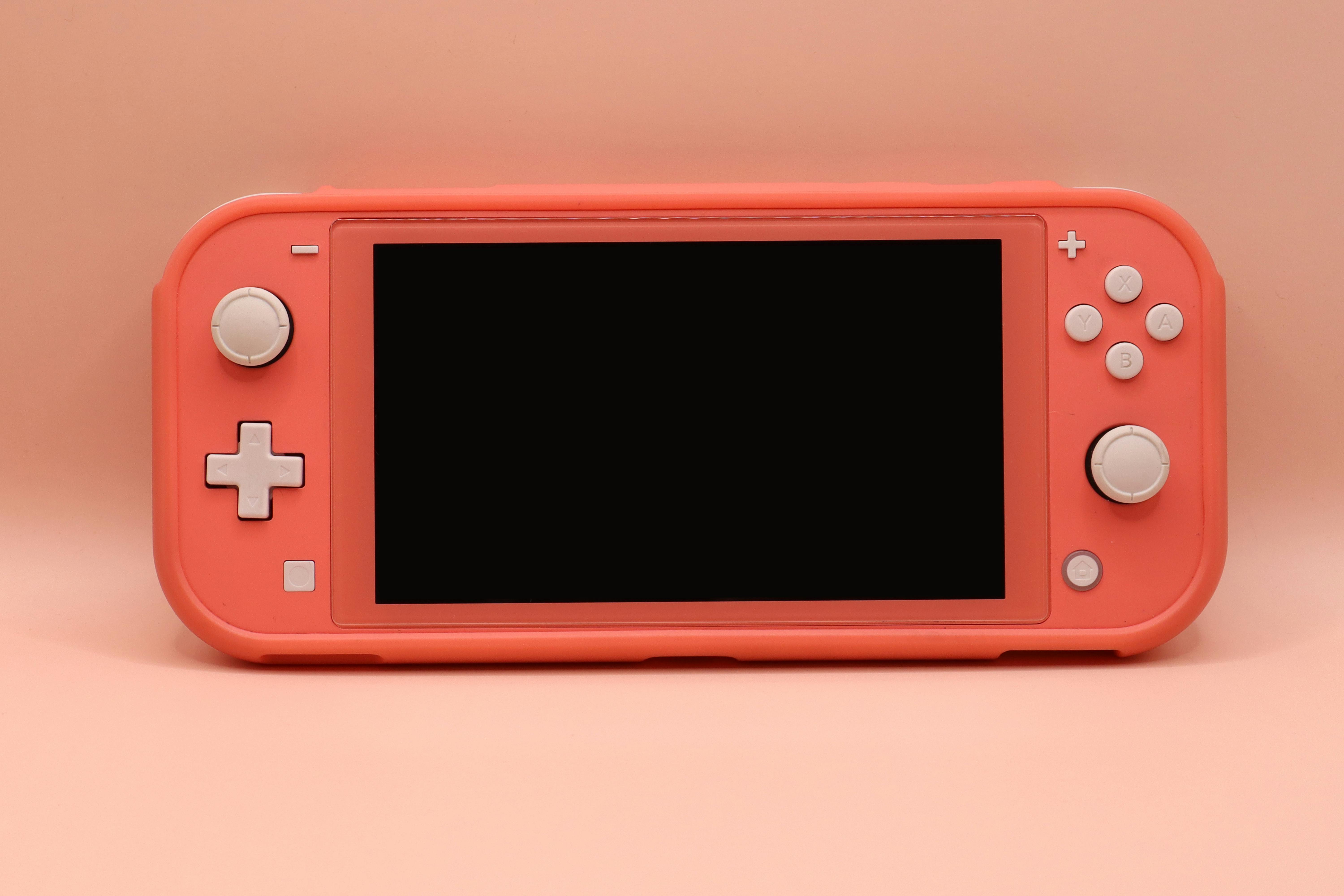 Close-up Photo of Red Game Boy Console · Free Stock Photo