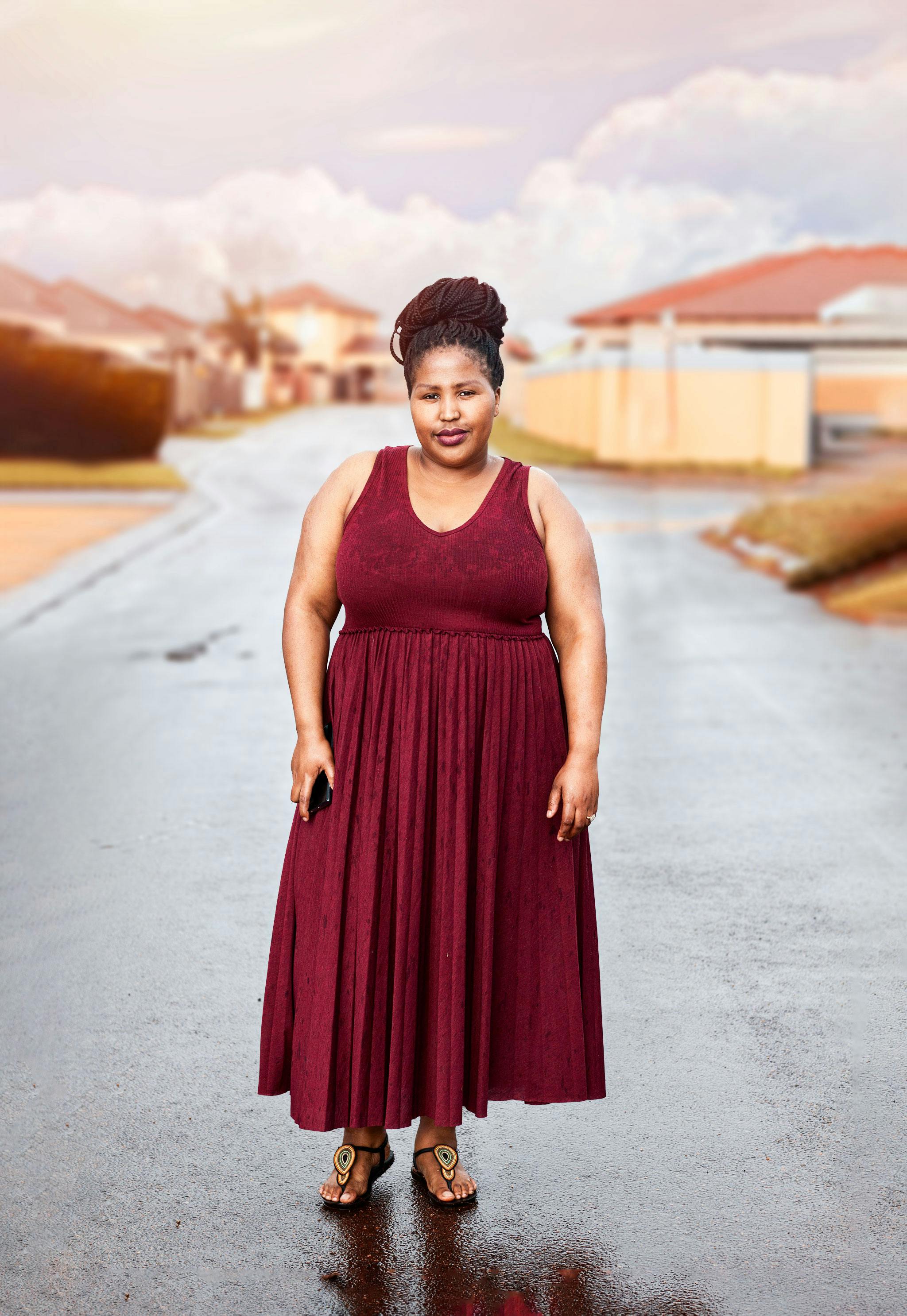 Plus Size Model Wearing a Red Dress · Free Stock Photo