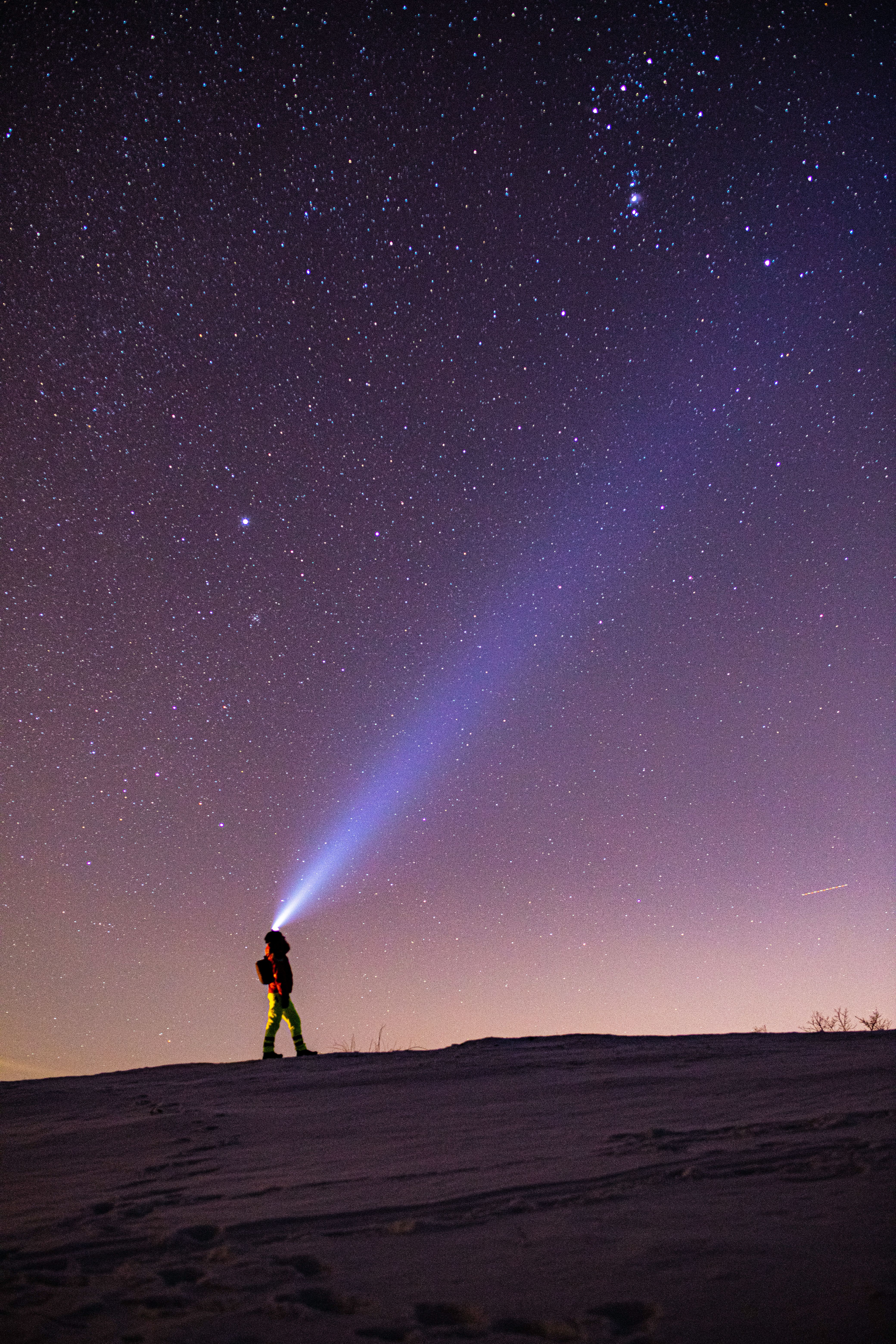 Person With Flashlight under Night Sky · Free Stock Photo