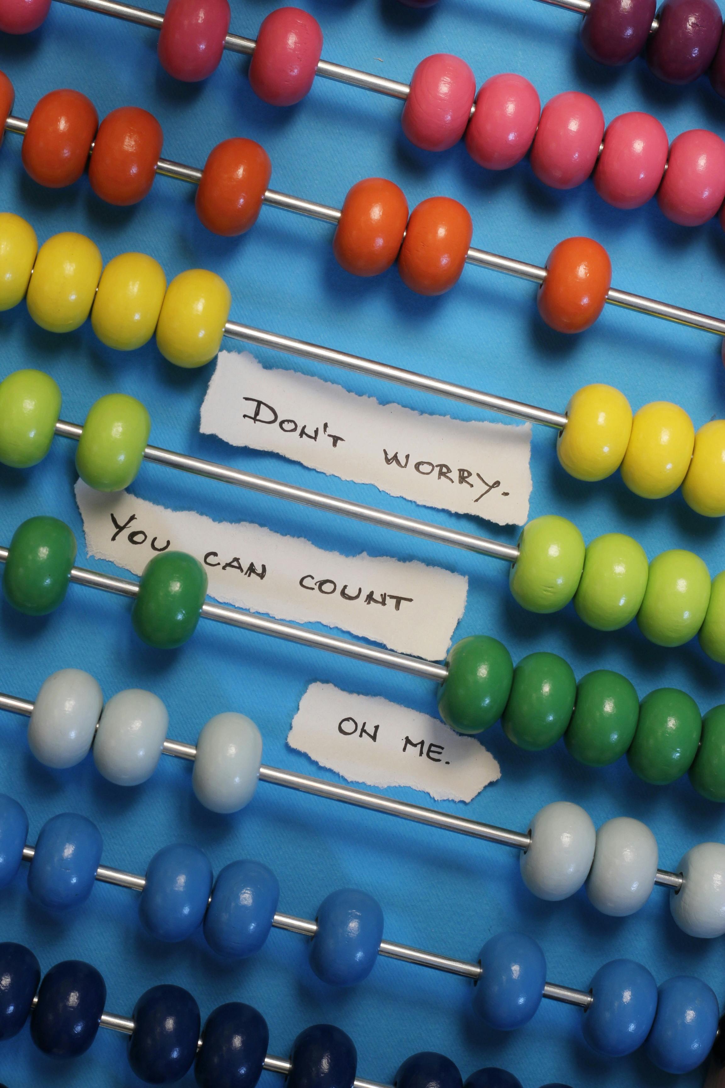 A Motivational Quote and an Abacus · Free Stock Photo