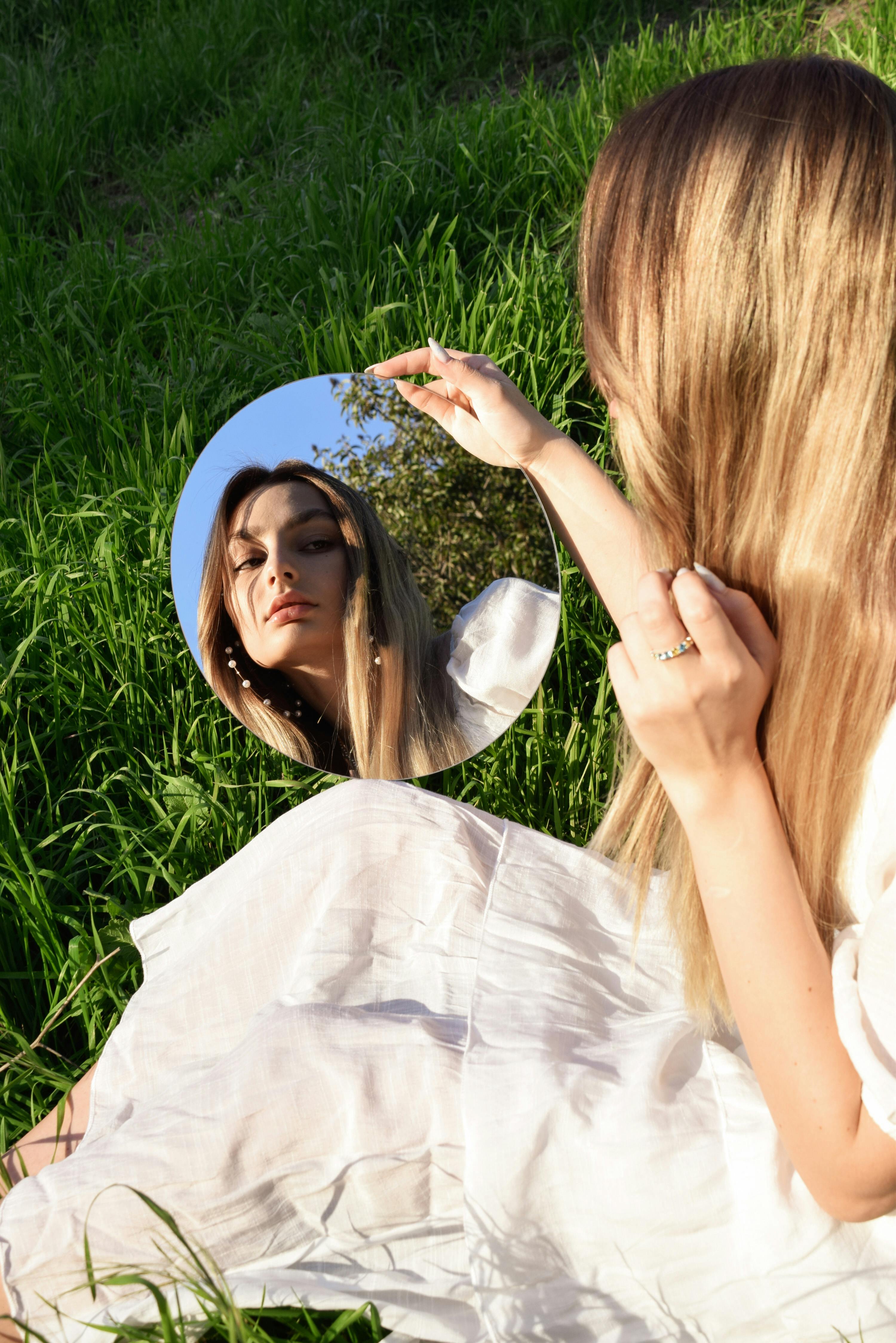 Woman with Her Mirror Reflection · Free Stock Photo