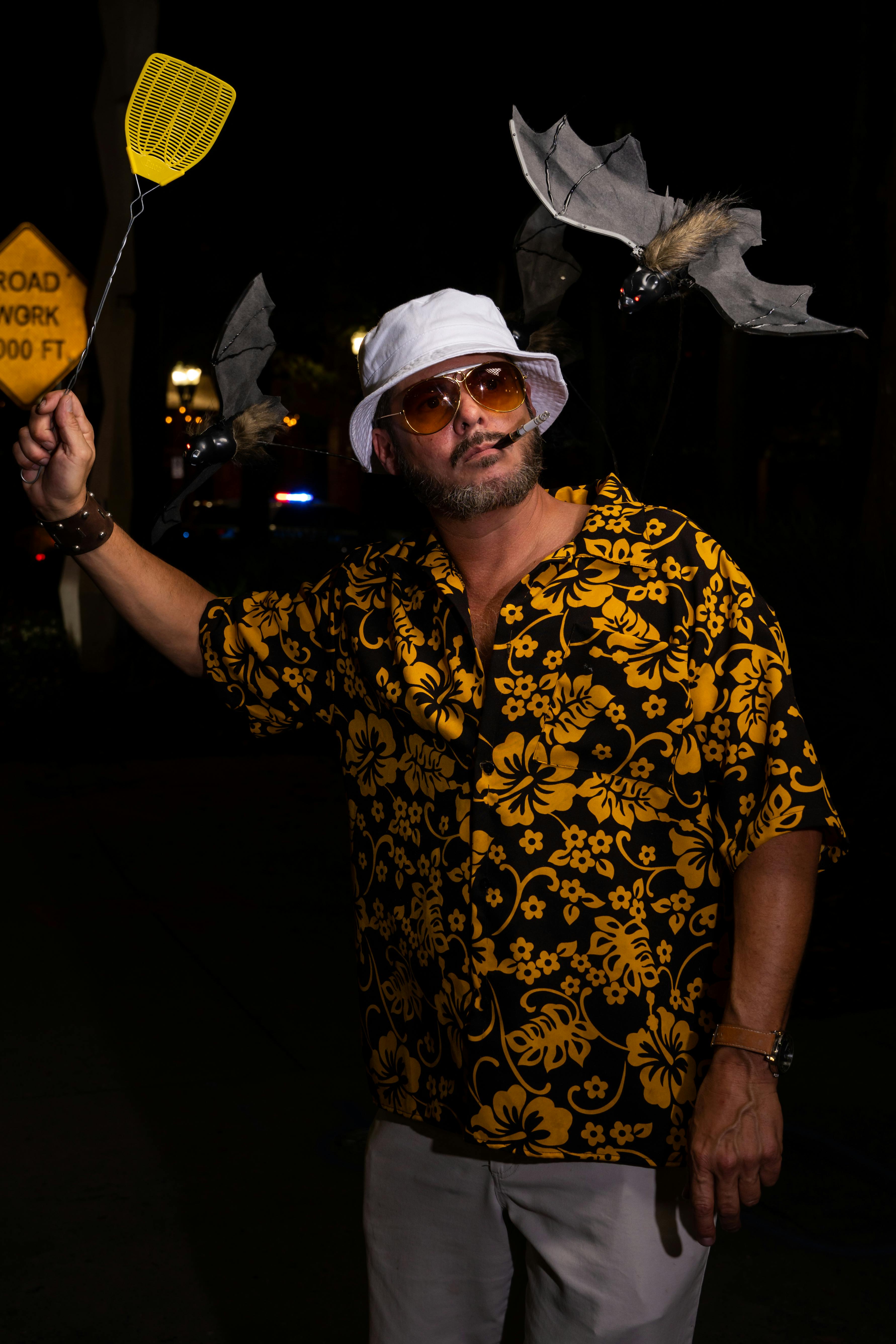 Man with Fly Swatter against Bat · Free Stock Photo