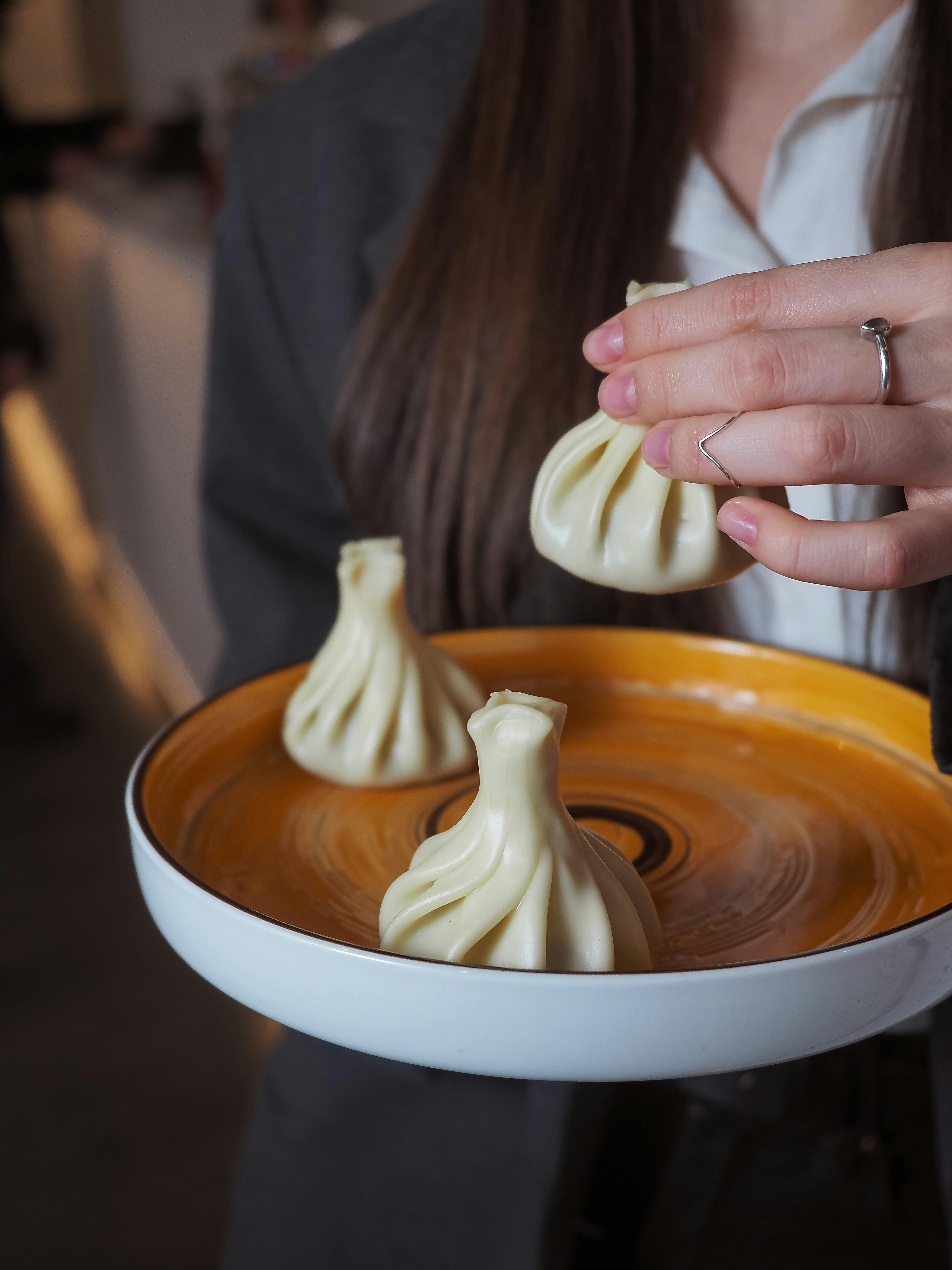 Woman Holding an Indian Dumplings · Free Stock Photo