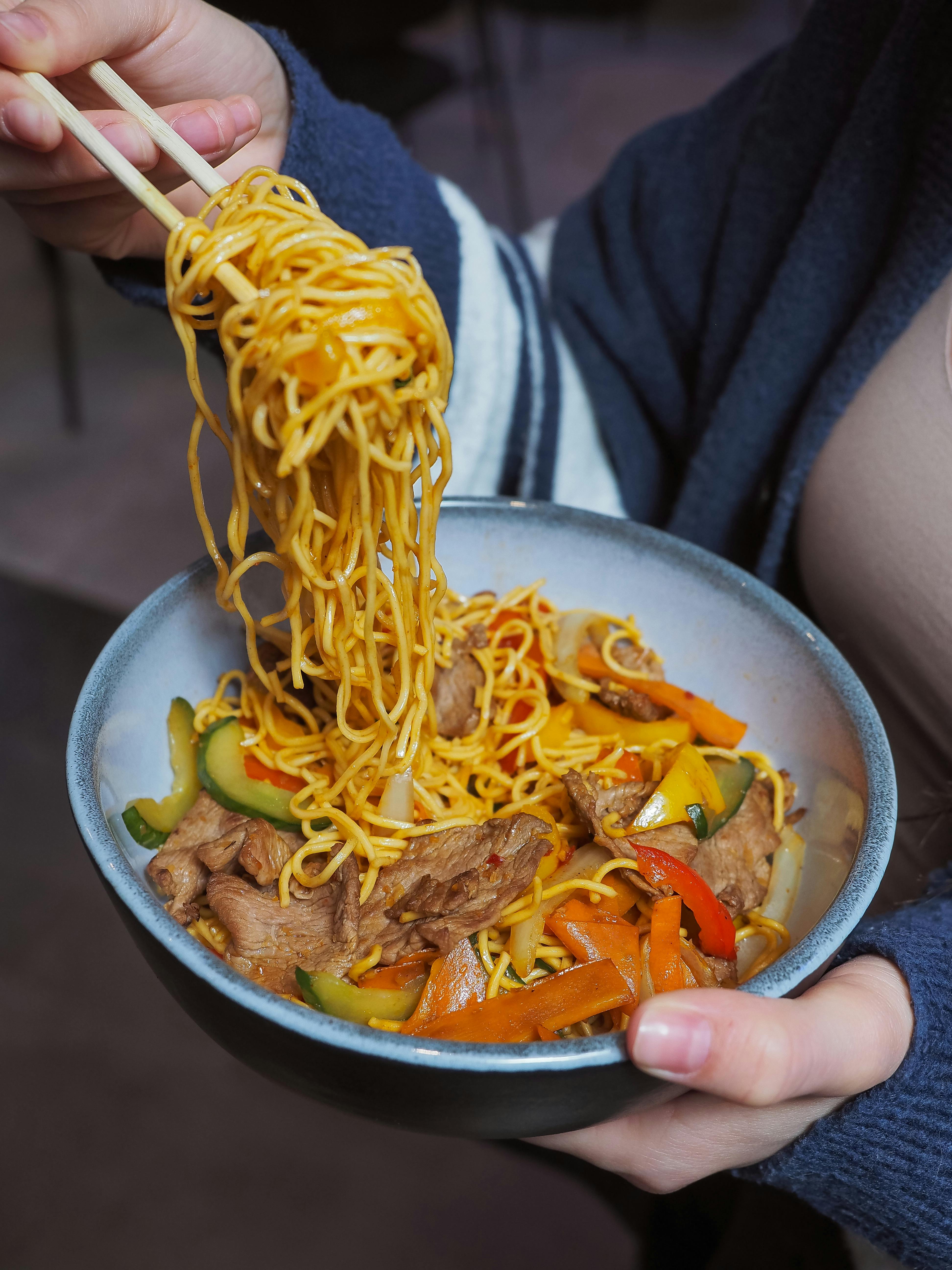 People Eating Noodles · Free Stock Photo