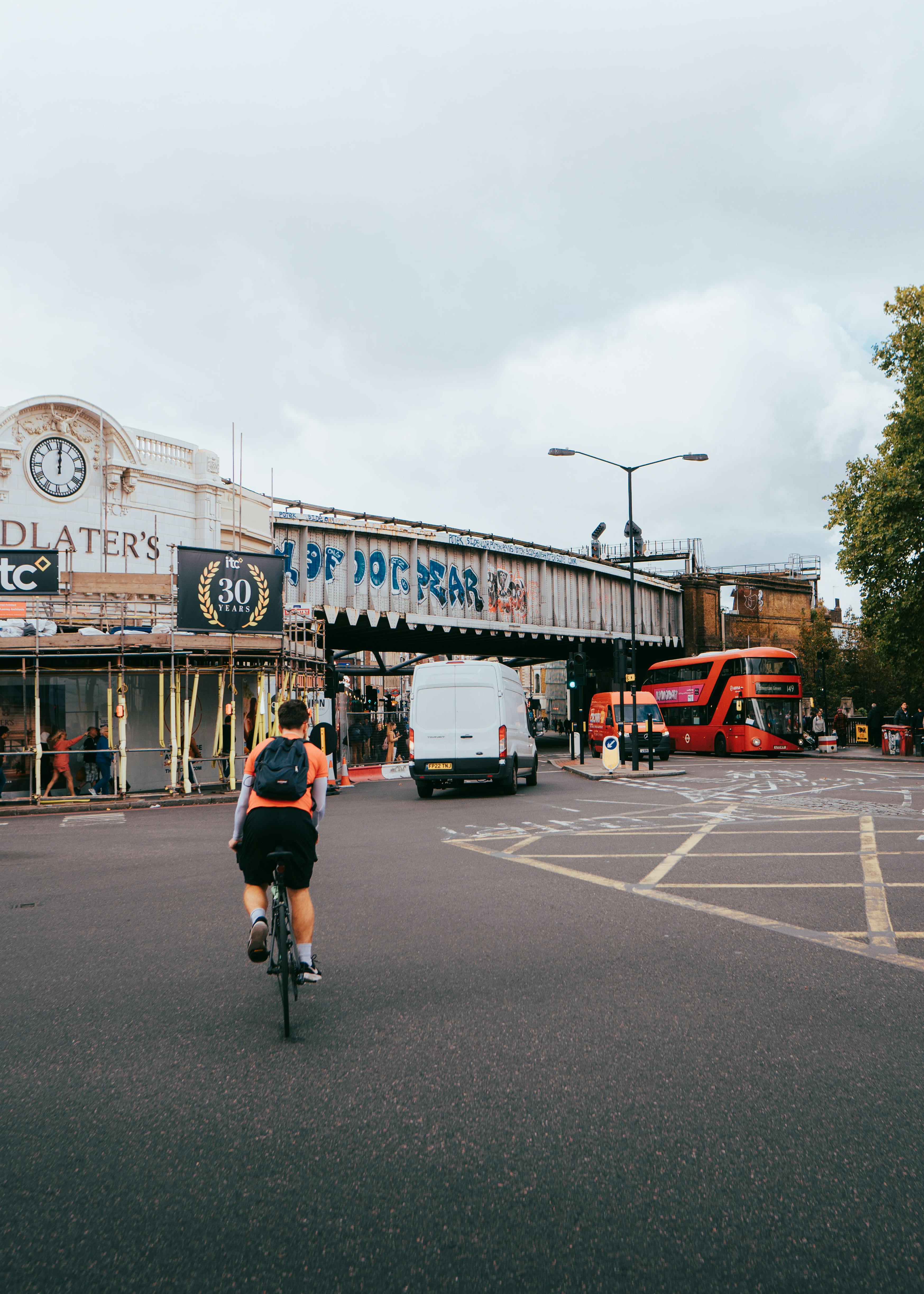 Traffic Under the Railway Overpass in London · Free Stock Photo