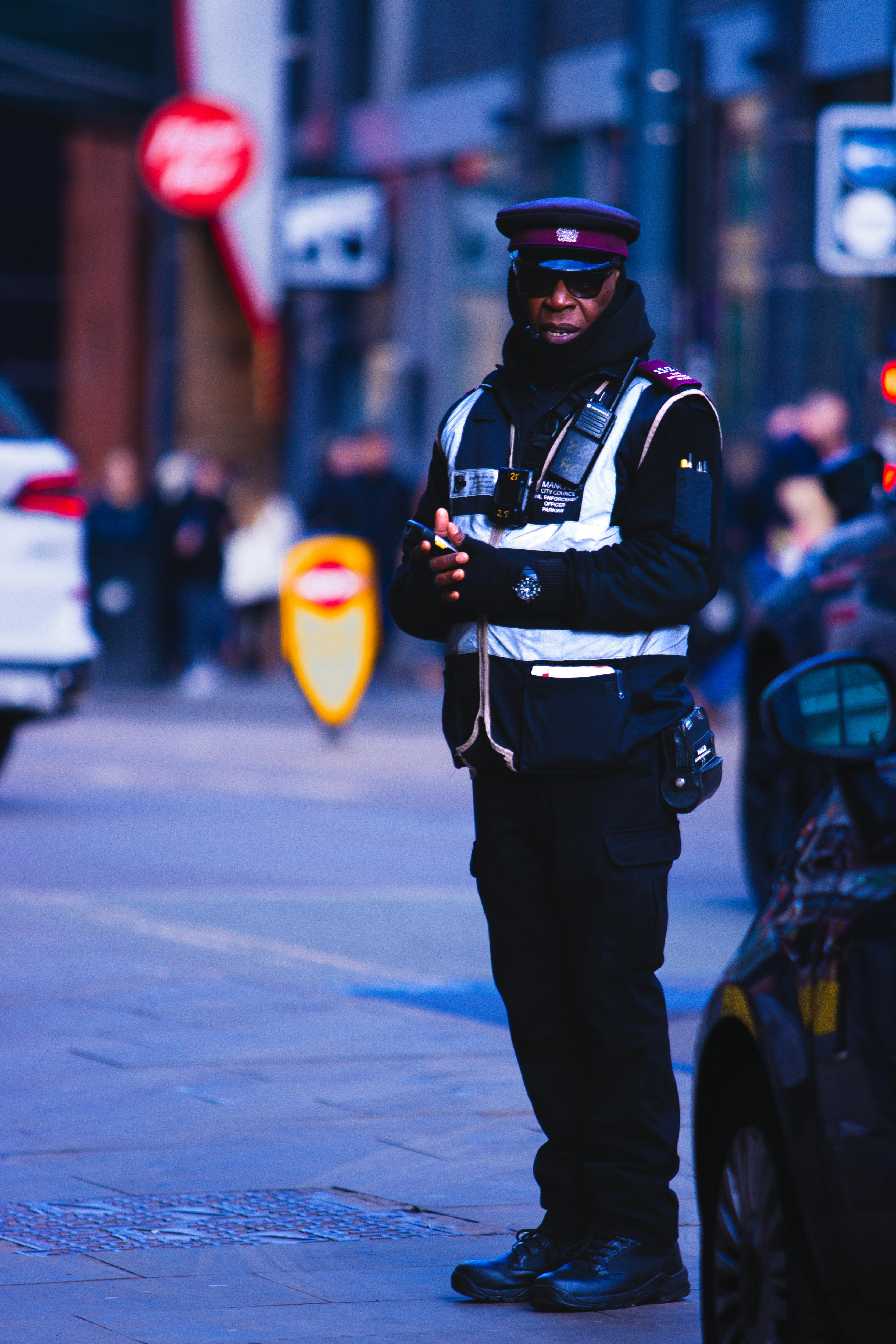 Policeman Standing on the Street · Free Stock Photo