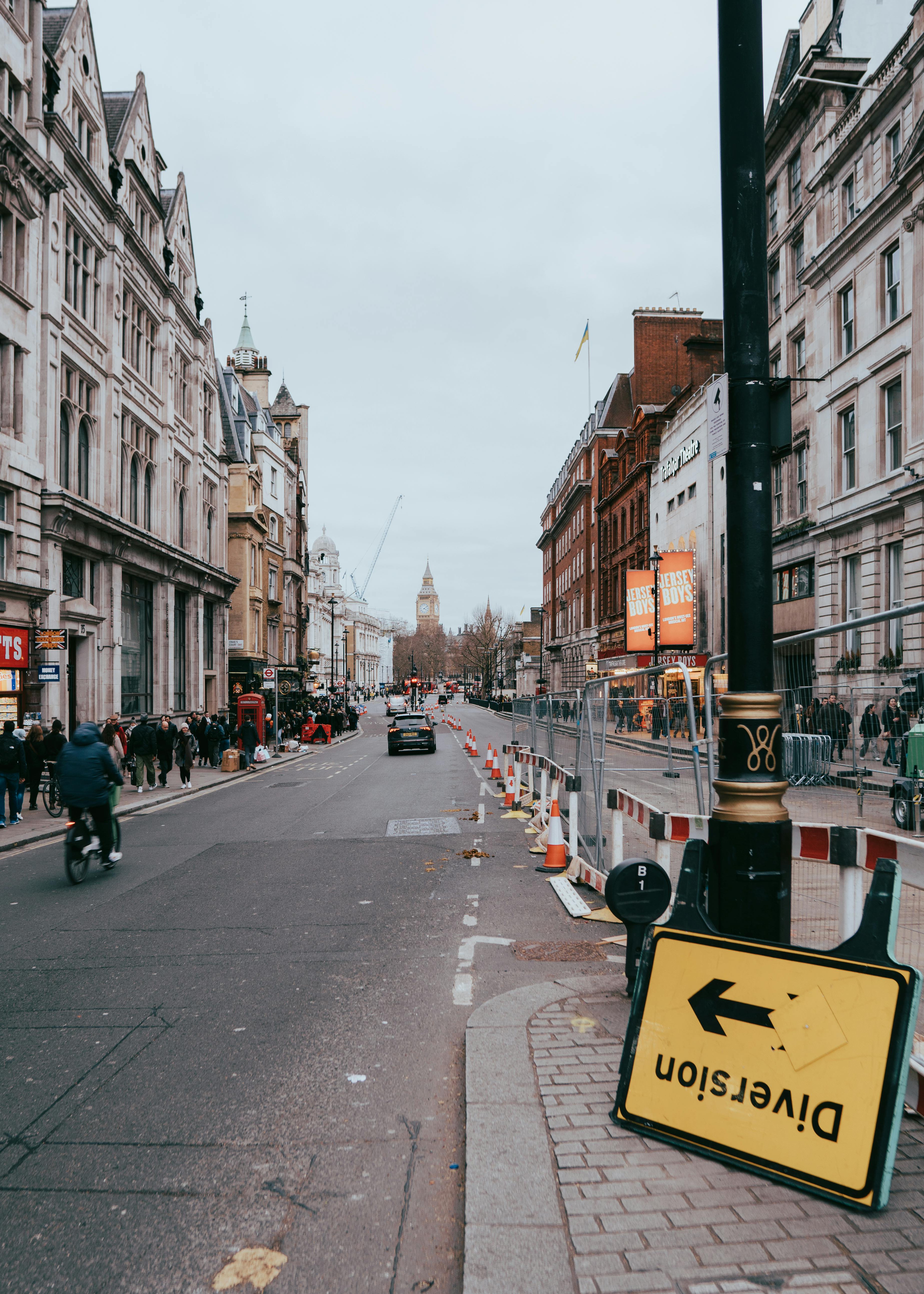 Upside Down Road Sign on the Sidewalk in London Street · Free Stock Photo