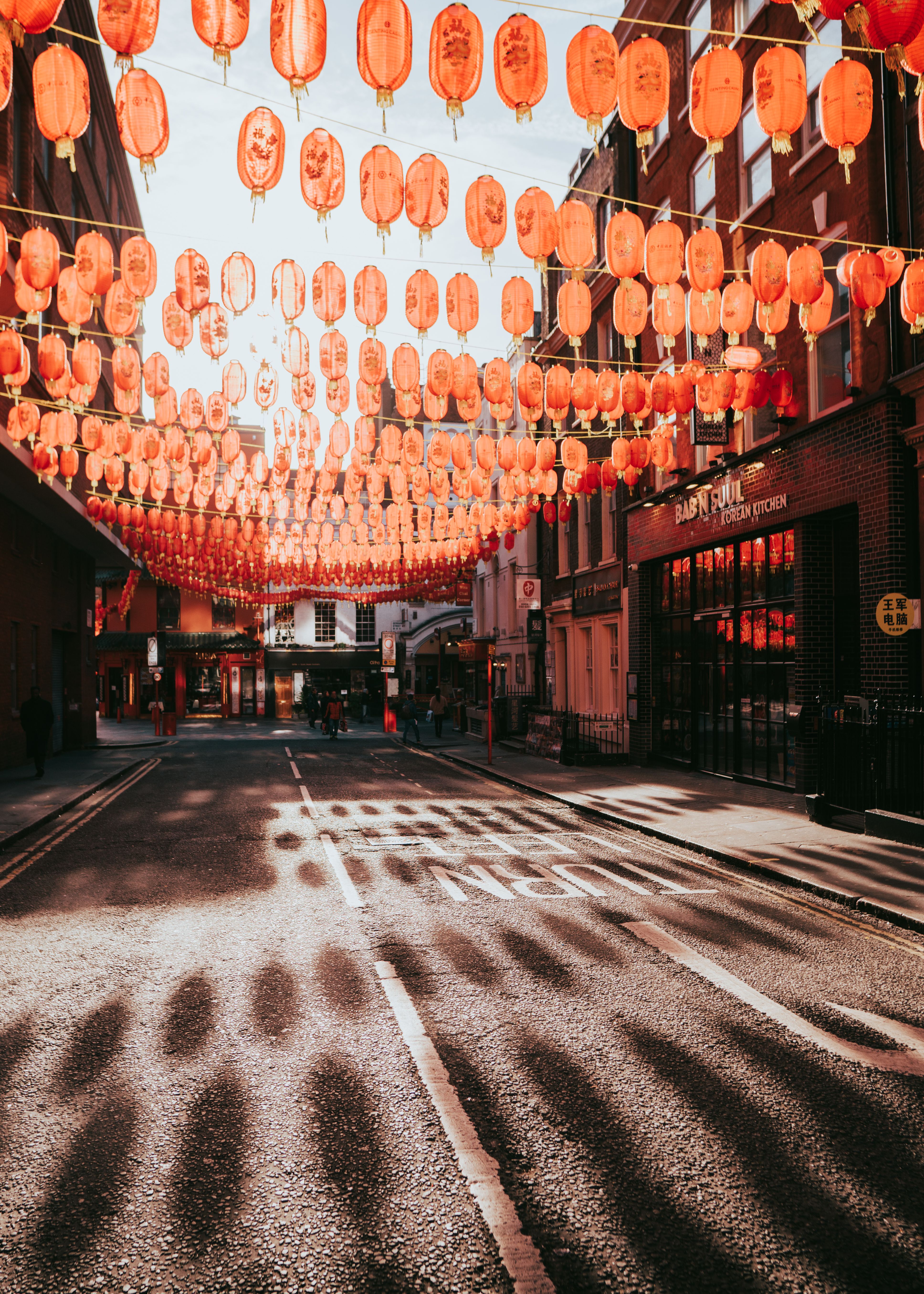 Red Lanterns Hanging over a Street in London · Free Stock Photo