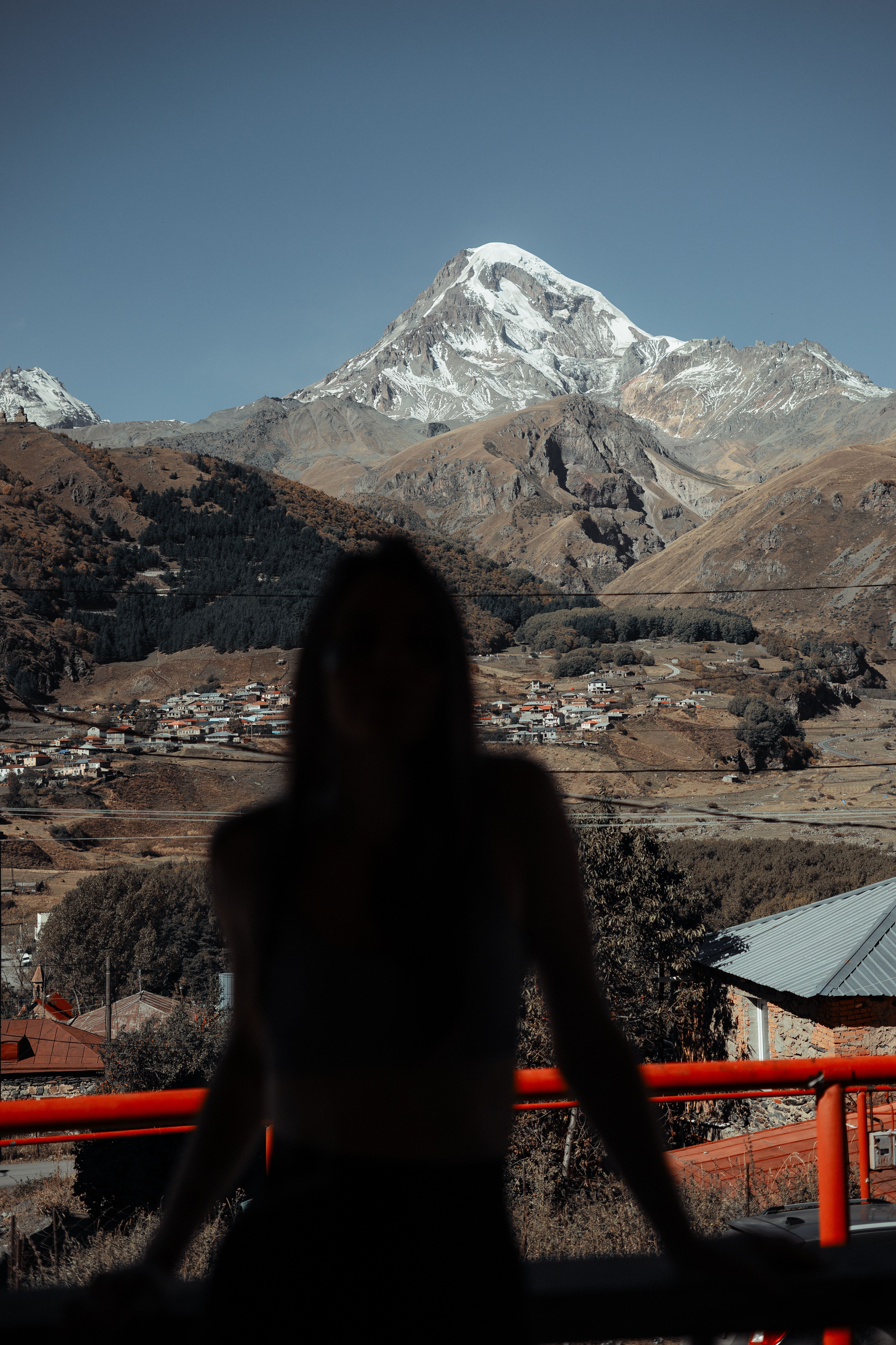 Silhouette of a Woman with Mountain Range in the Background · Free ...
