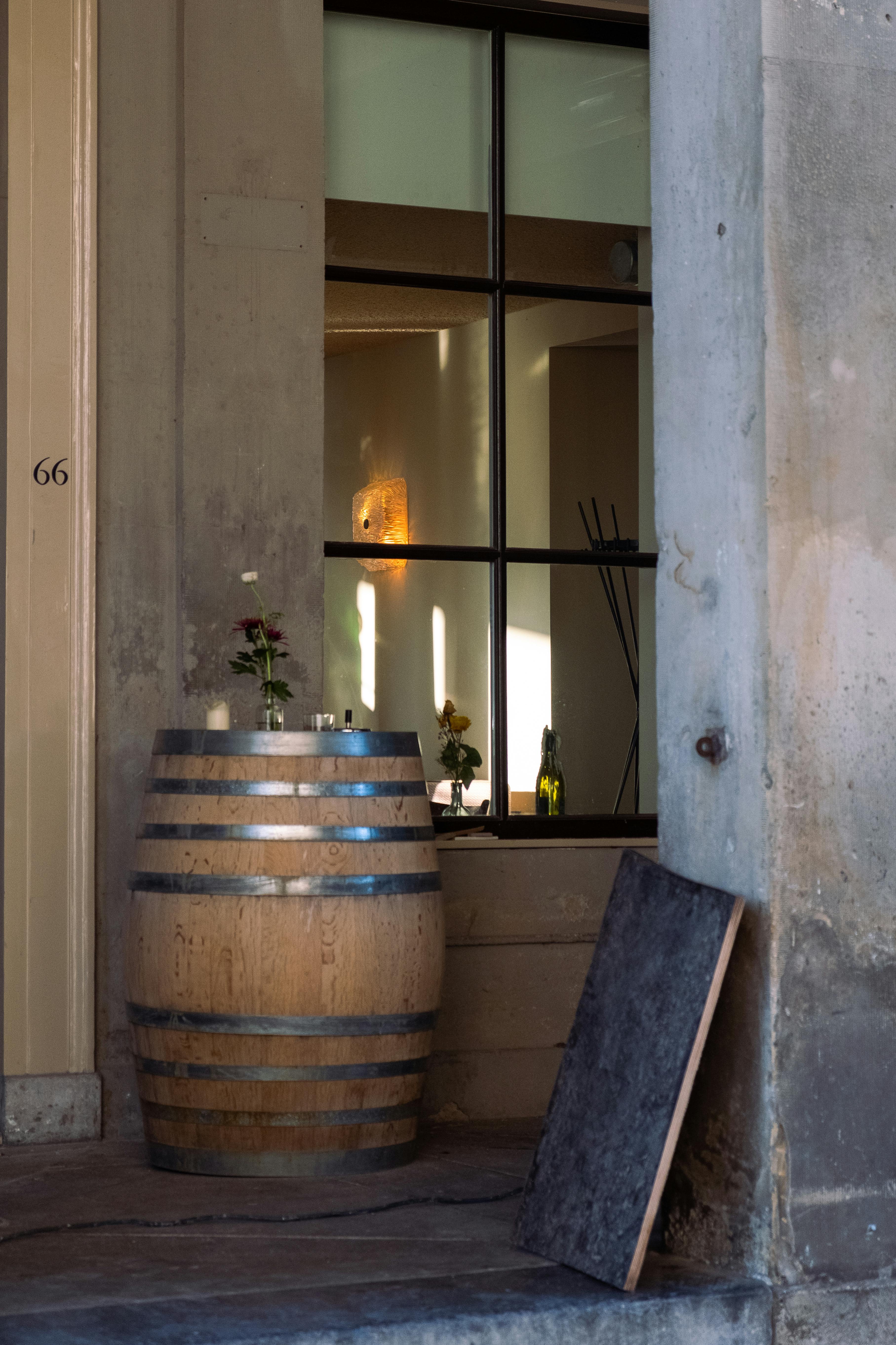 A Wooden Barrel Outside the Building · Free Stock Photo