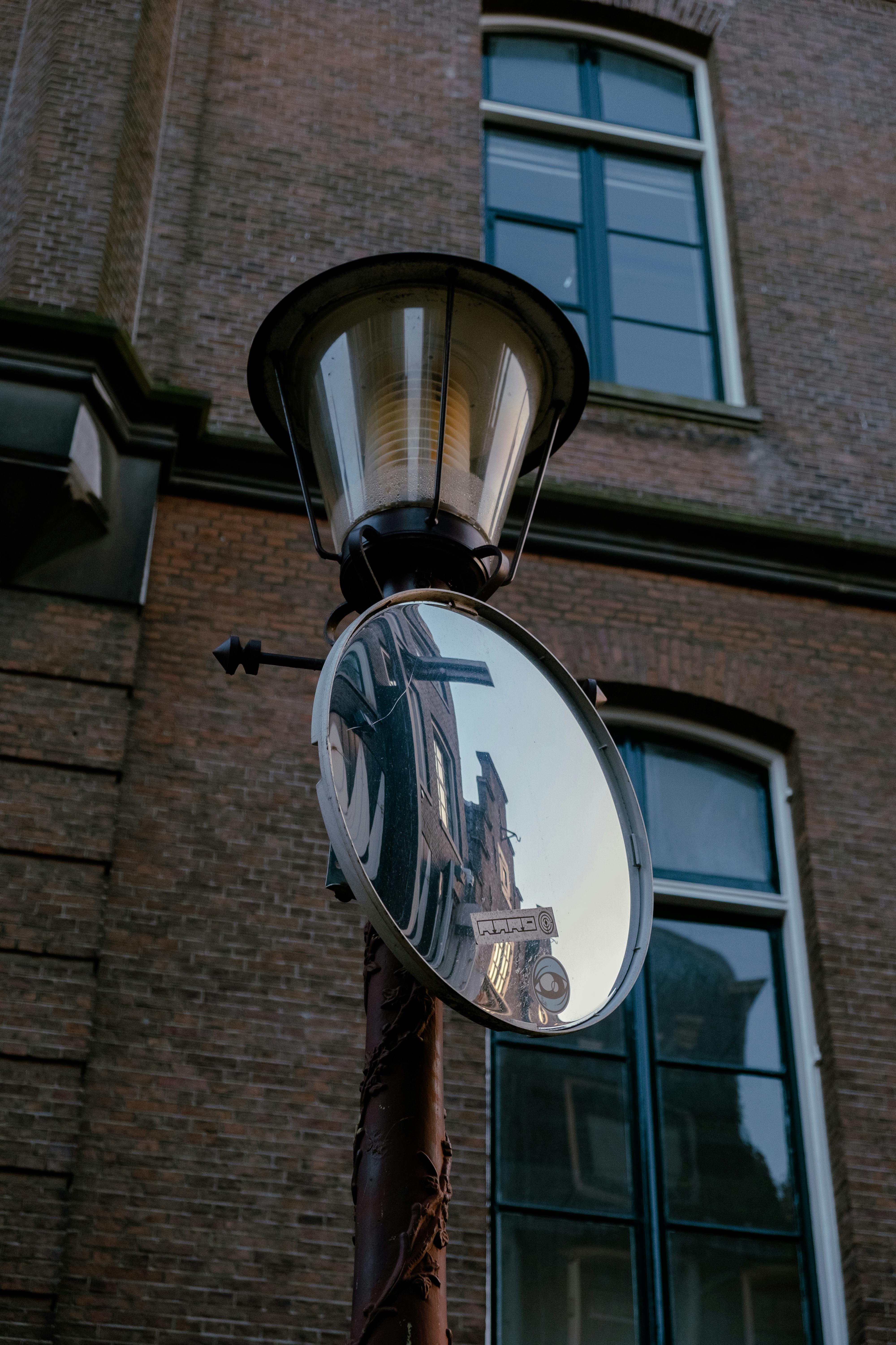 Urban Mirror Hanging on a Lamp Post · Free Stock Photo