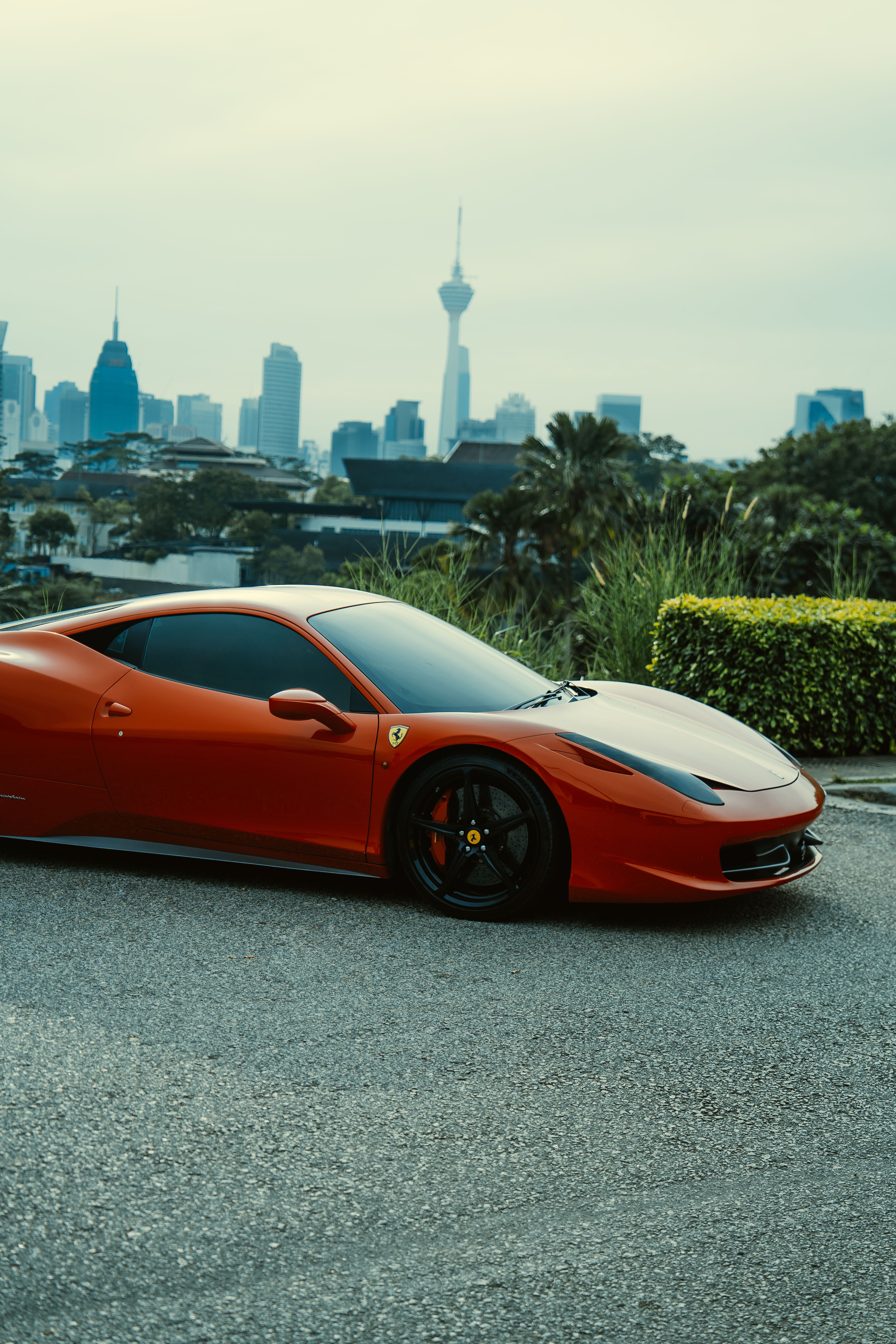 Ferrari Branding on Wet Car · Free Stock Photo