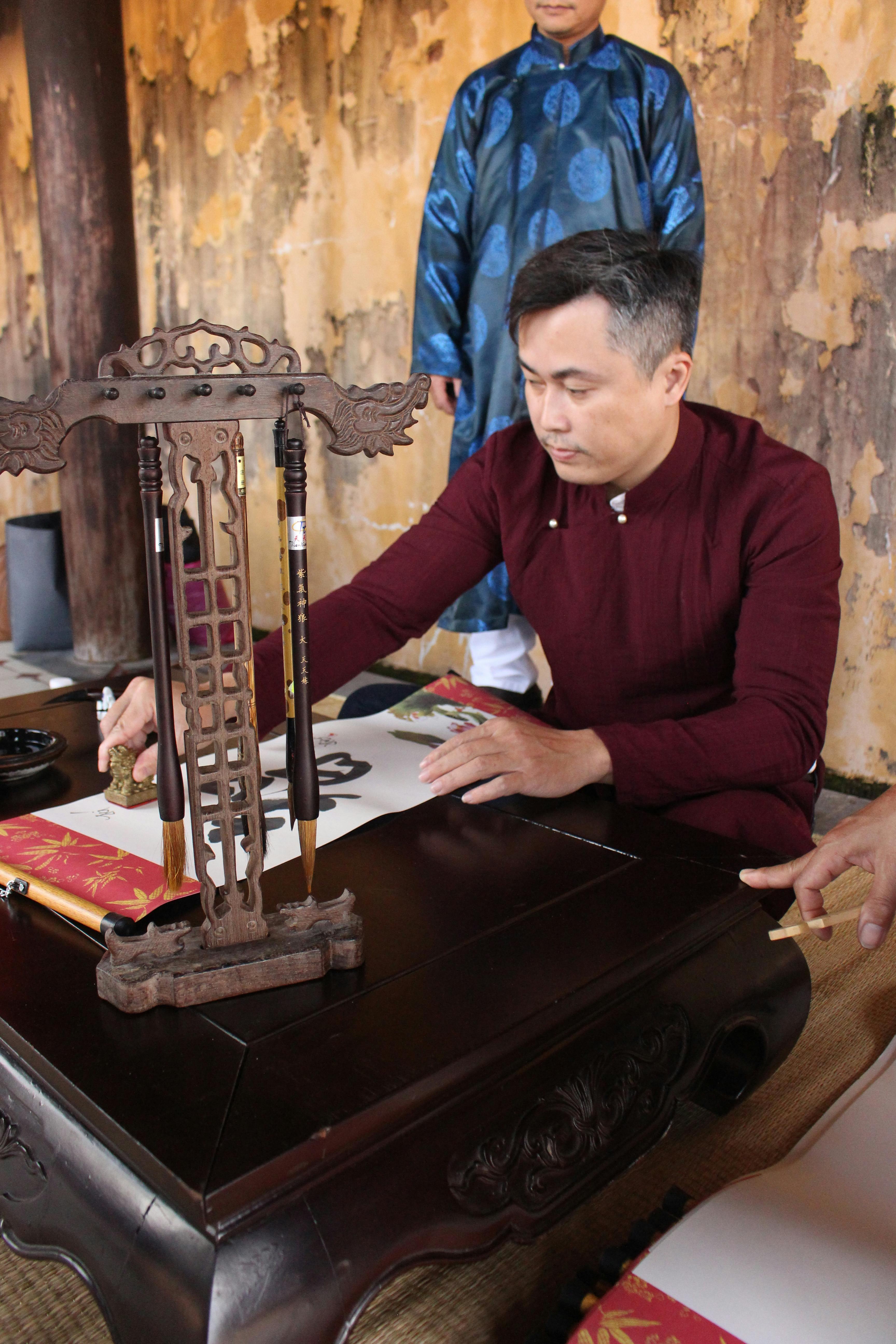 A Man Making Calligraphy Art · Free Stock Photo