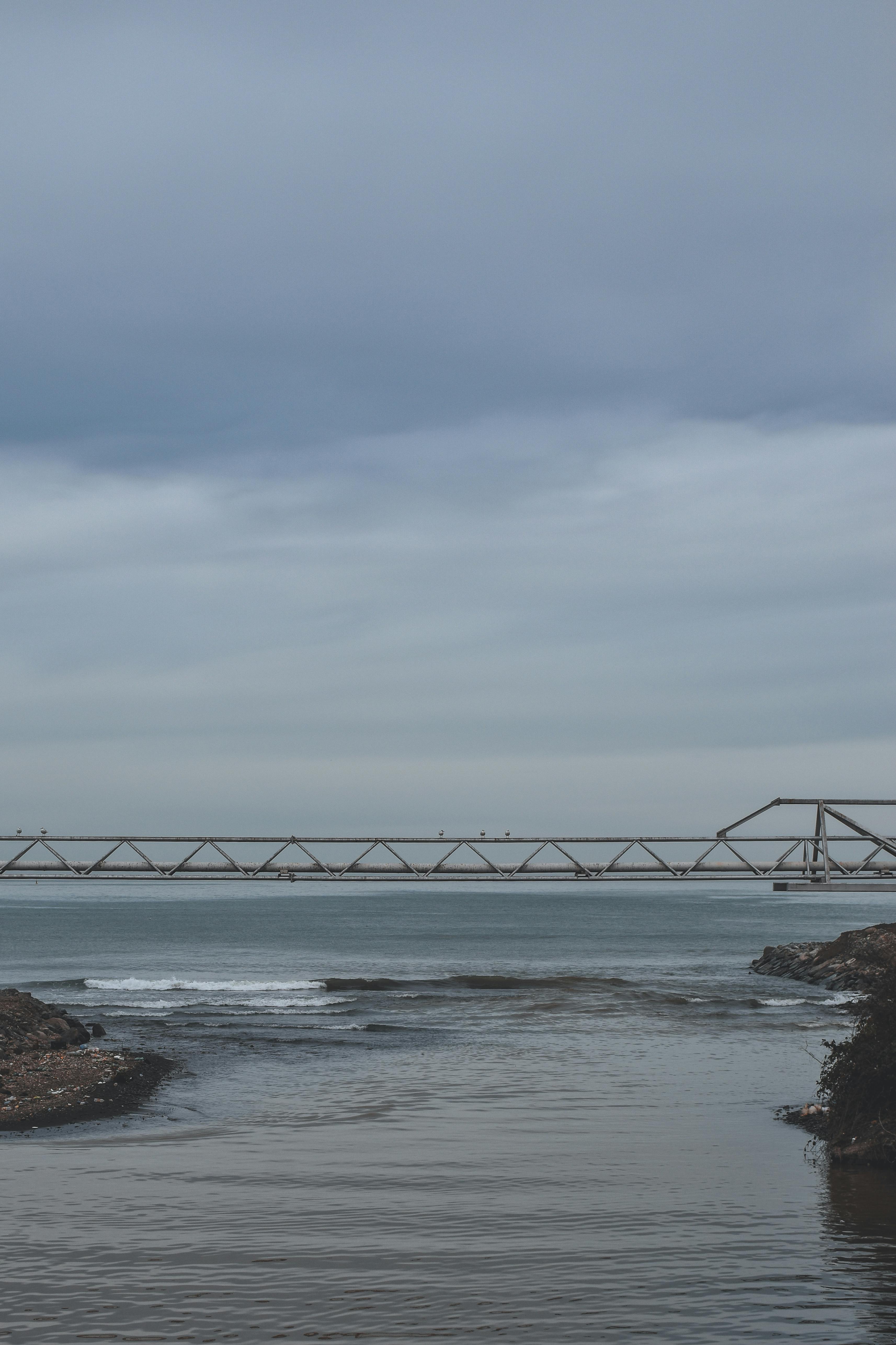 Bridge in Water on Sunset · Free Stock Photo