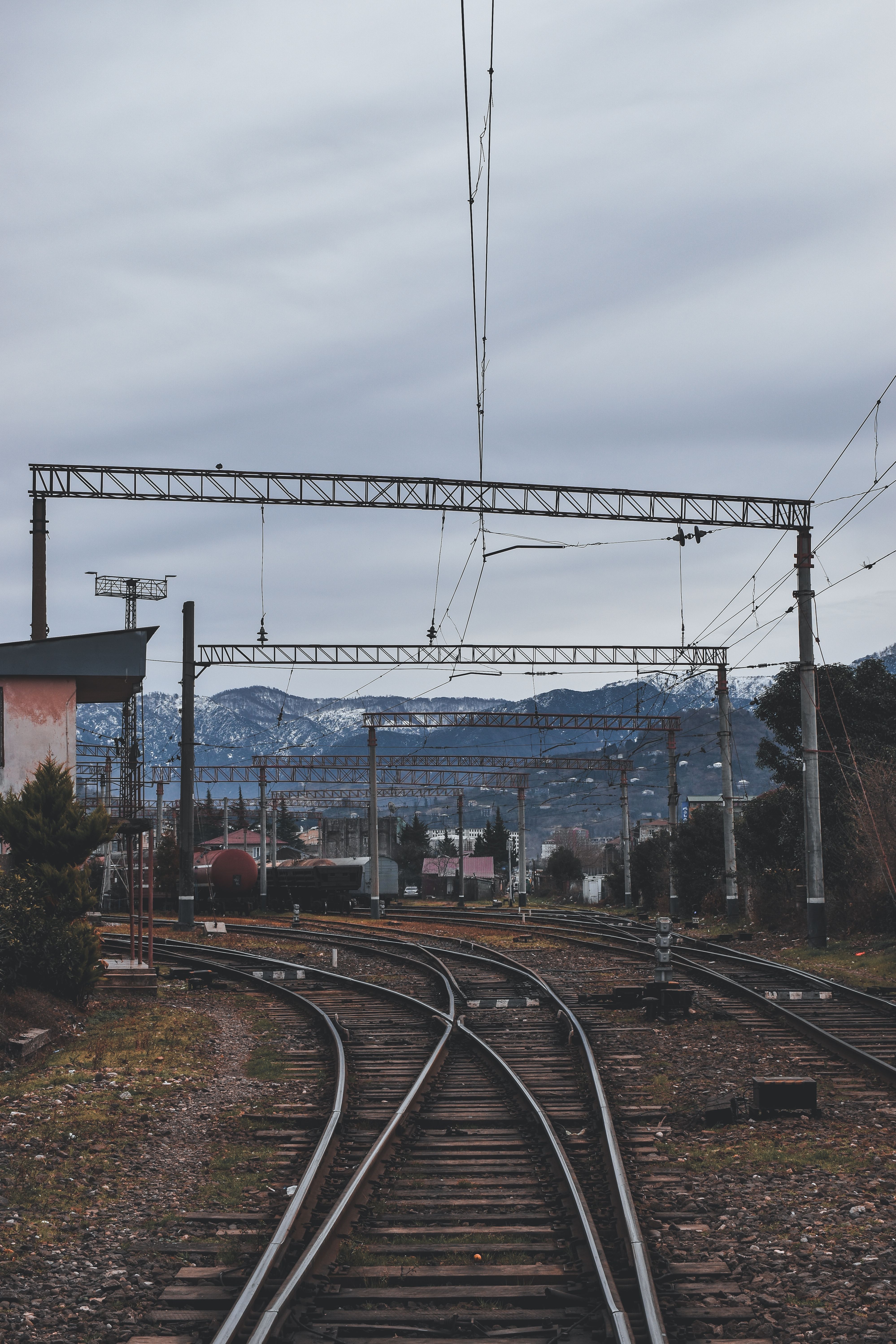 Electricity Lines above Railroad Tracks · Free Stock Photo