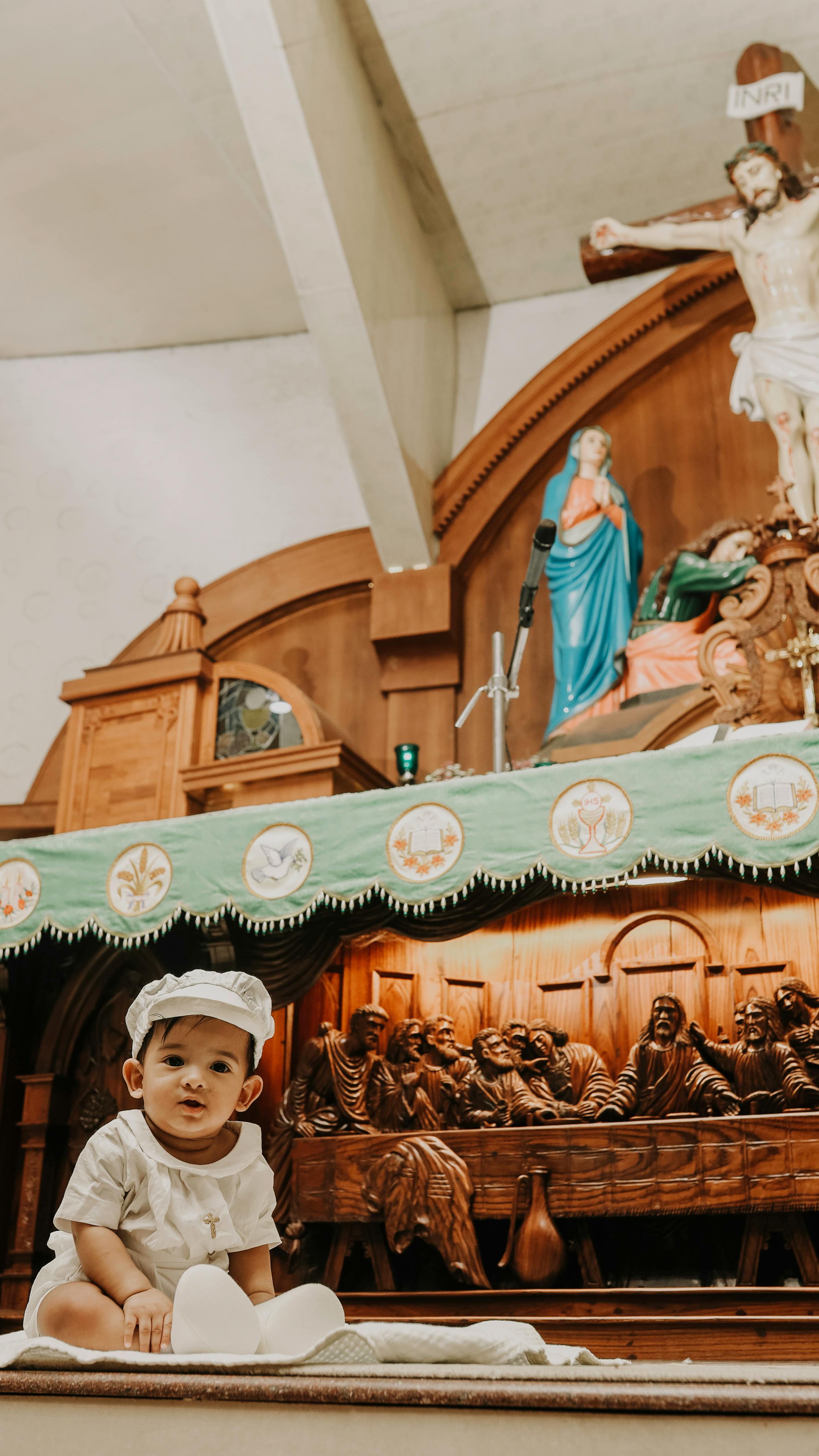 Cute Child Sitting at Altar in Church · Free Stock Photo