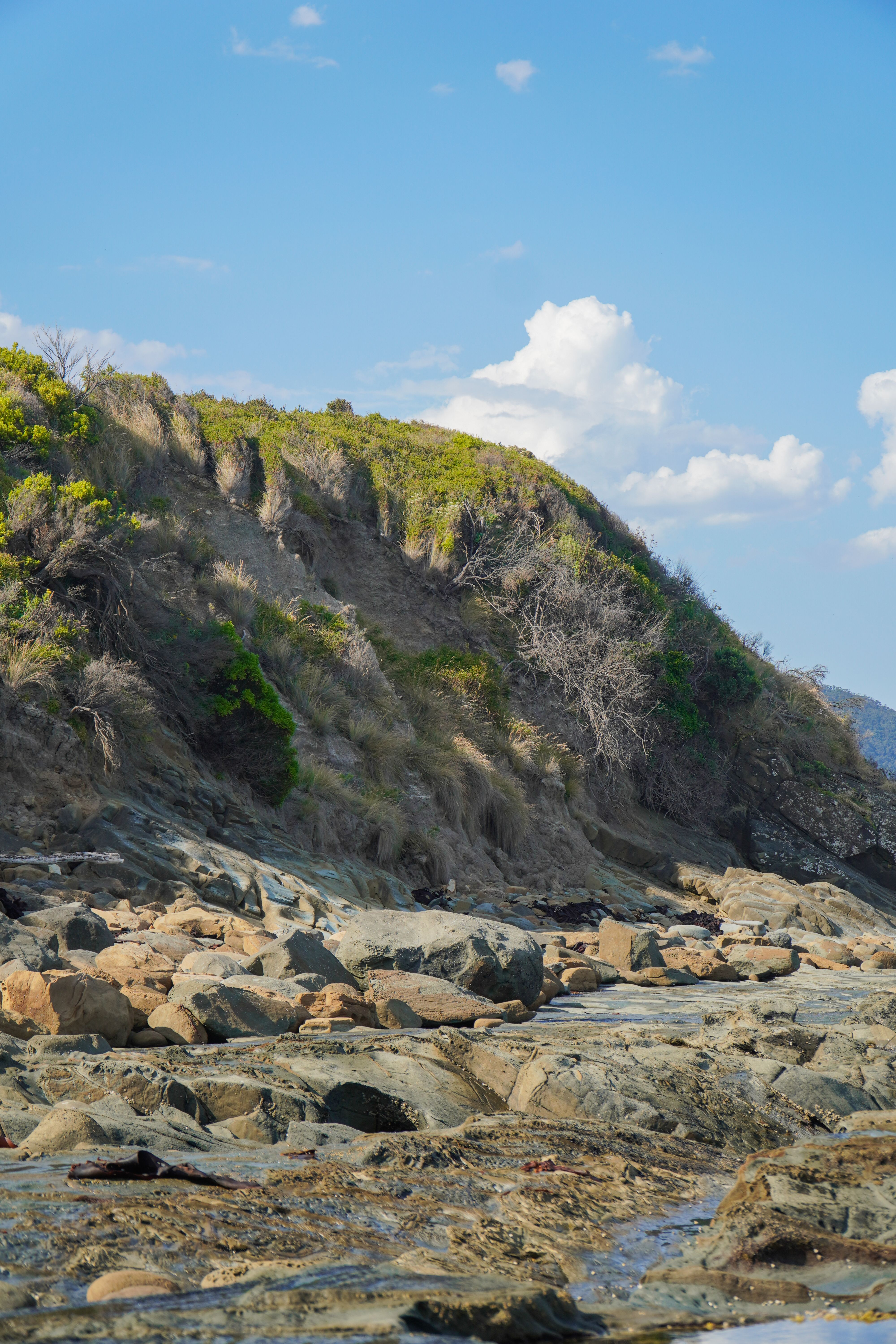 Rocky Stream and a Hill · Free Stock Photo
