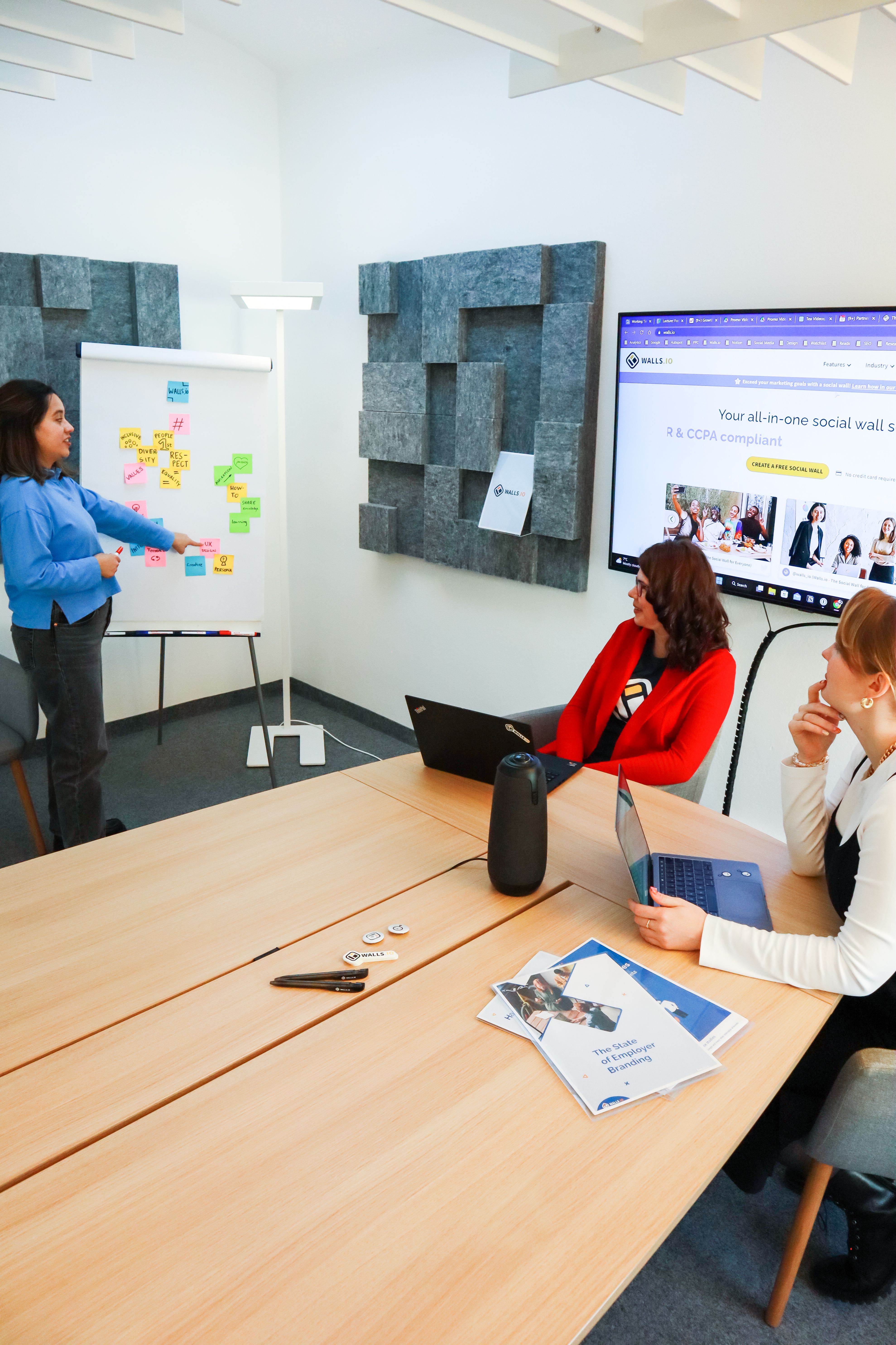 Female Engineer Holding Presentation · Free Stock Photo