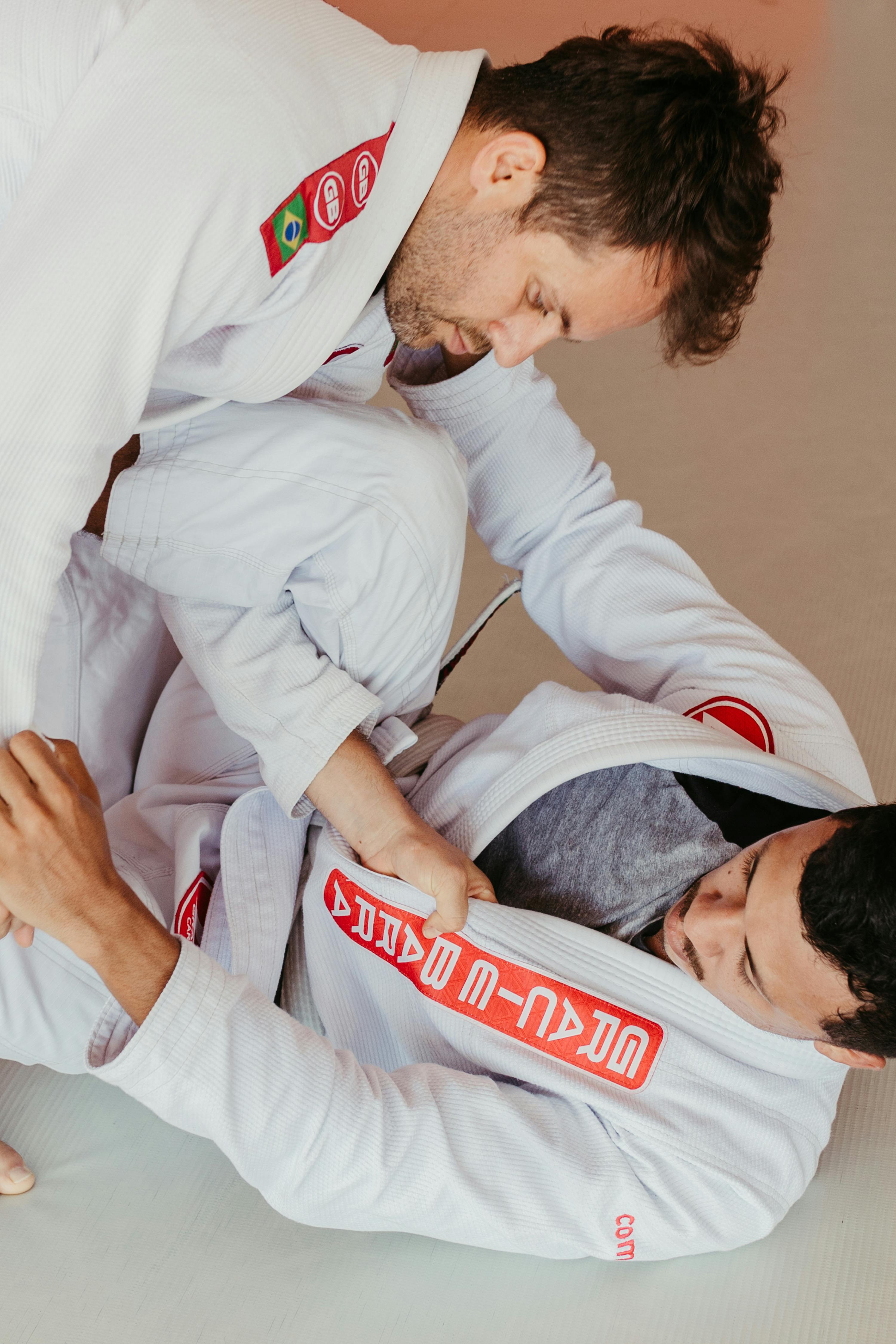 Two Male Jiu-Jitsu Practitioners Sparring · Free Stock Photo