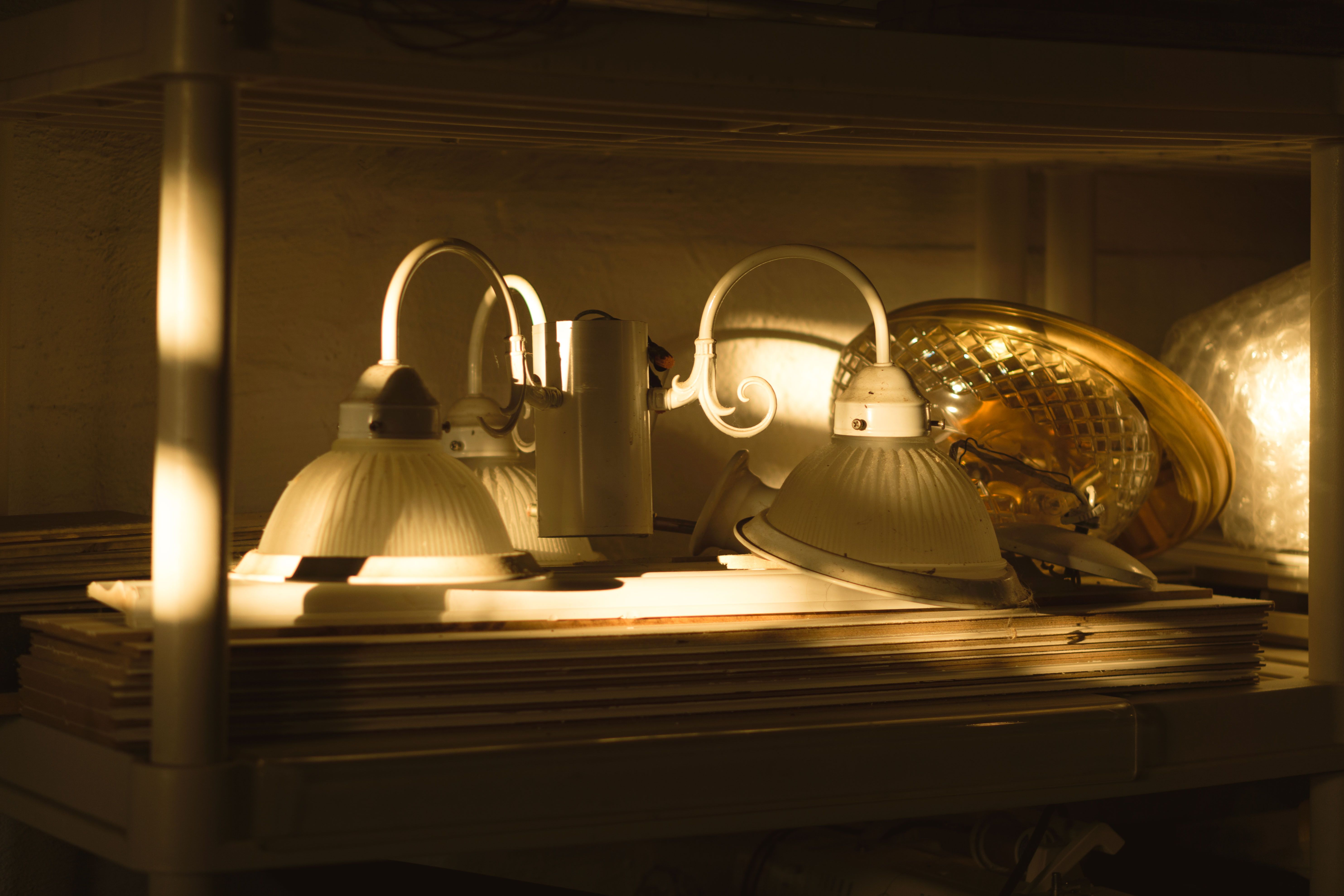 Lamps on Shelf in Storage · Free Stock Photo