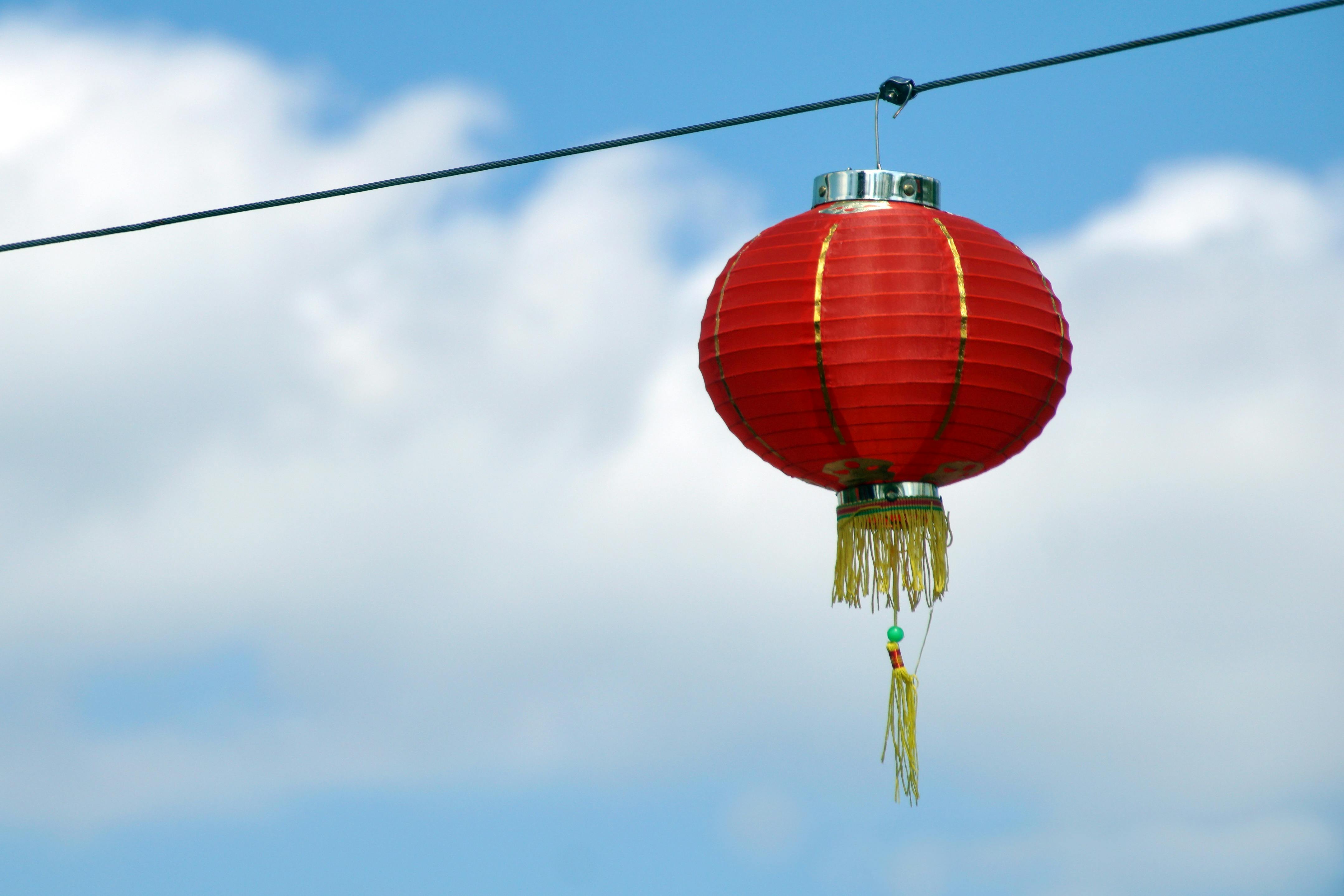 Red Lantern Hanging on the Rope · Free Stock Photo